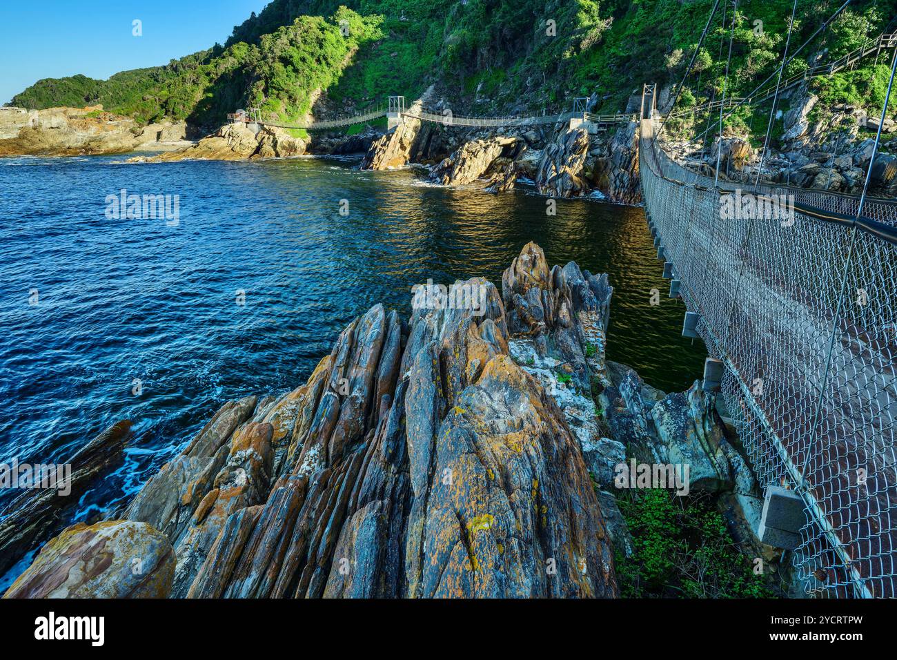 Multi-section suspension bridge spanning Storms River, Storms River ...