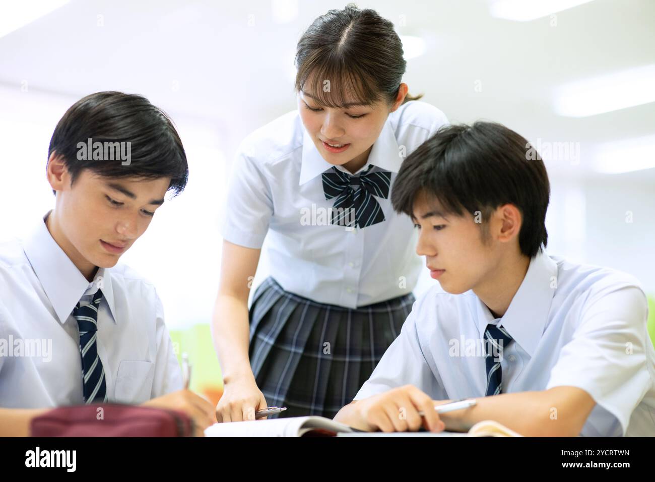 High school students studying with friends Stock Photo - Alamy
