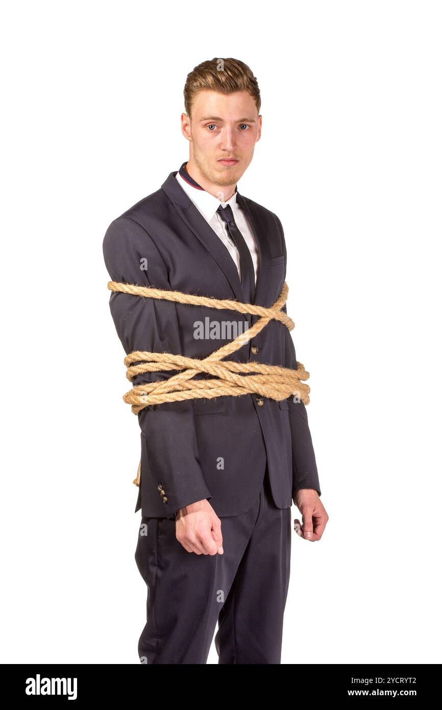 Businessman tied up in rope Stock Photo - Alamy