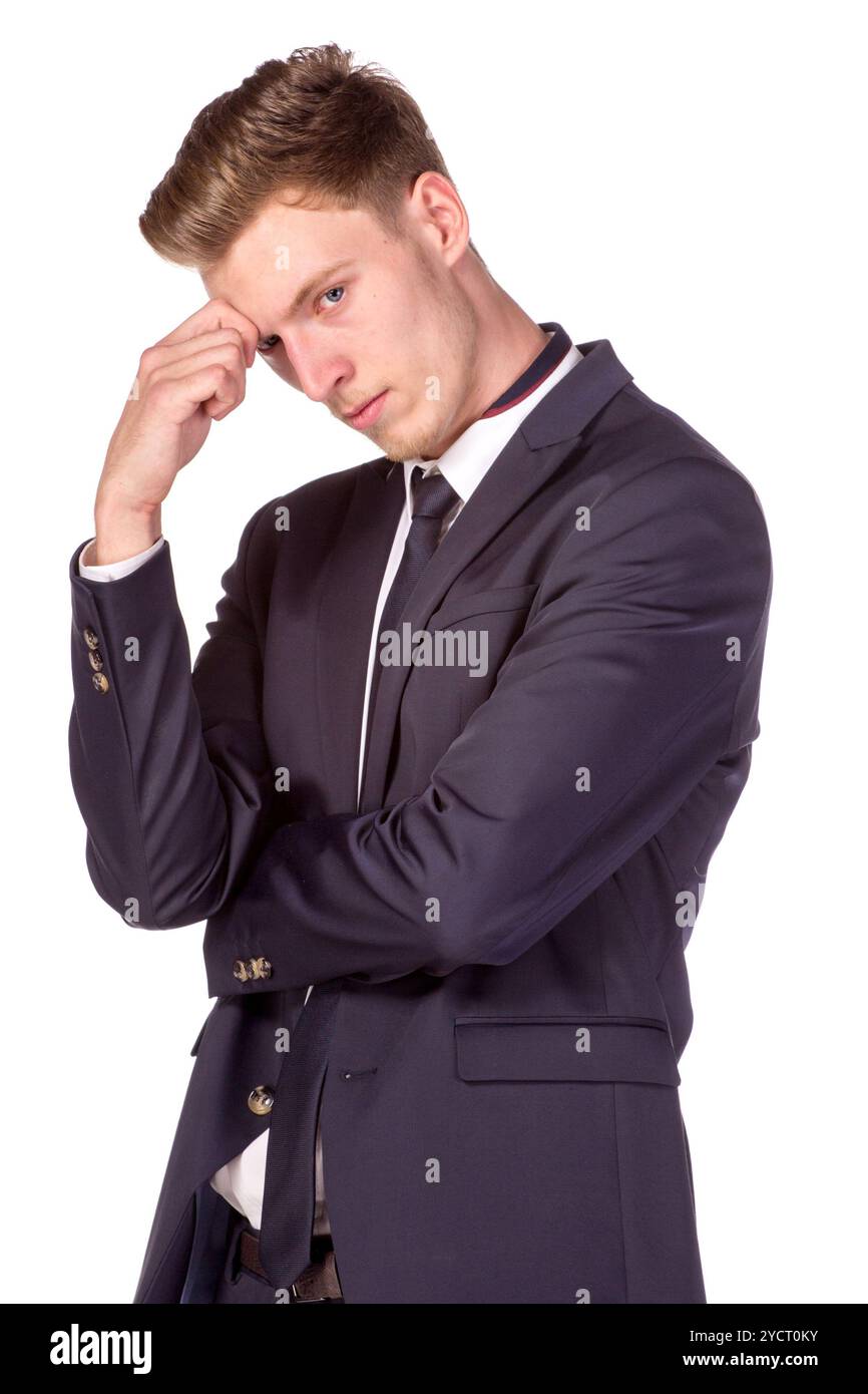 Serious young man thinking looking hi-res stock photography and images ...