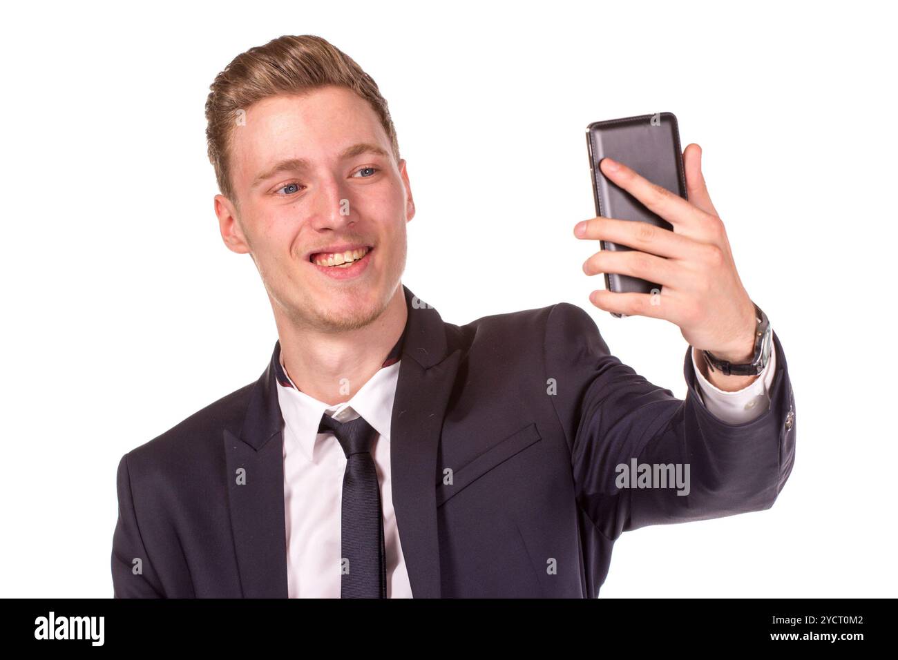 Happy thoughtful businessman looking up hi-res stock photography and ...