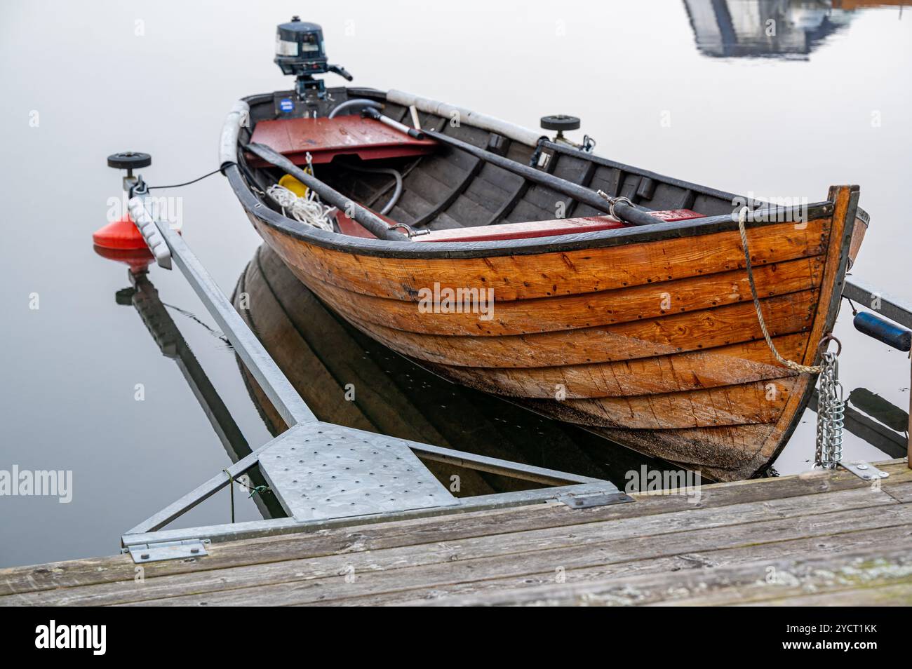 Old beautiful wooden punt with small engine Stock Photo - Alamy