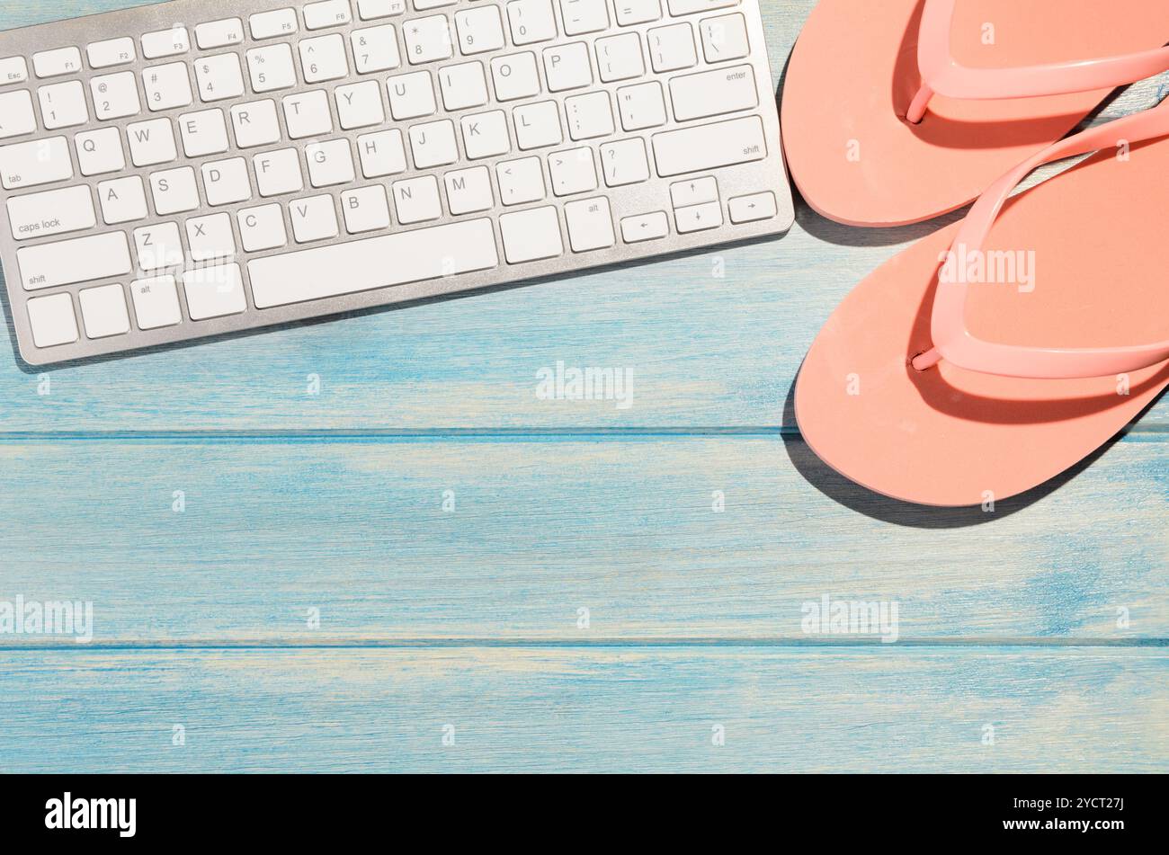 Keyboard on beach table Stock Photo - Alamy