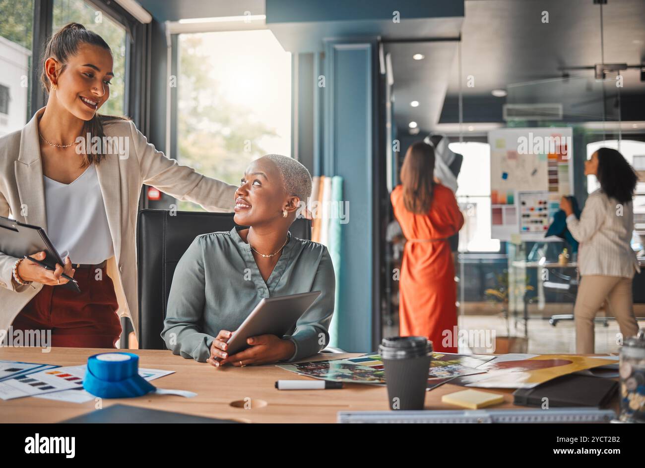 Workshop, fashion designer and tablet with business people in office ...