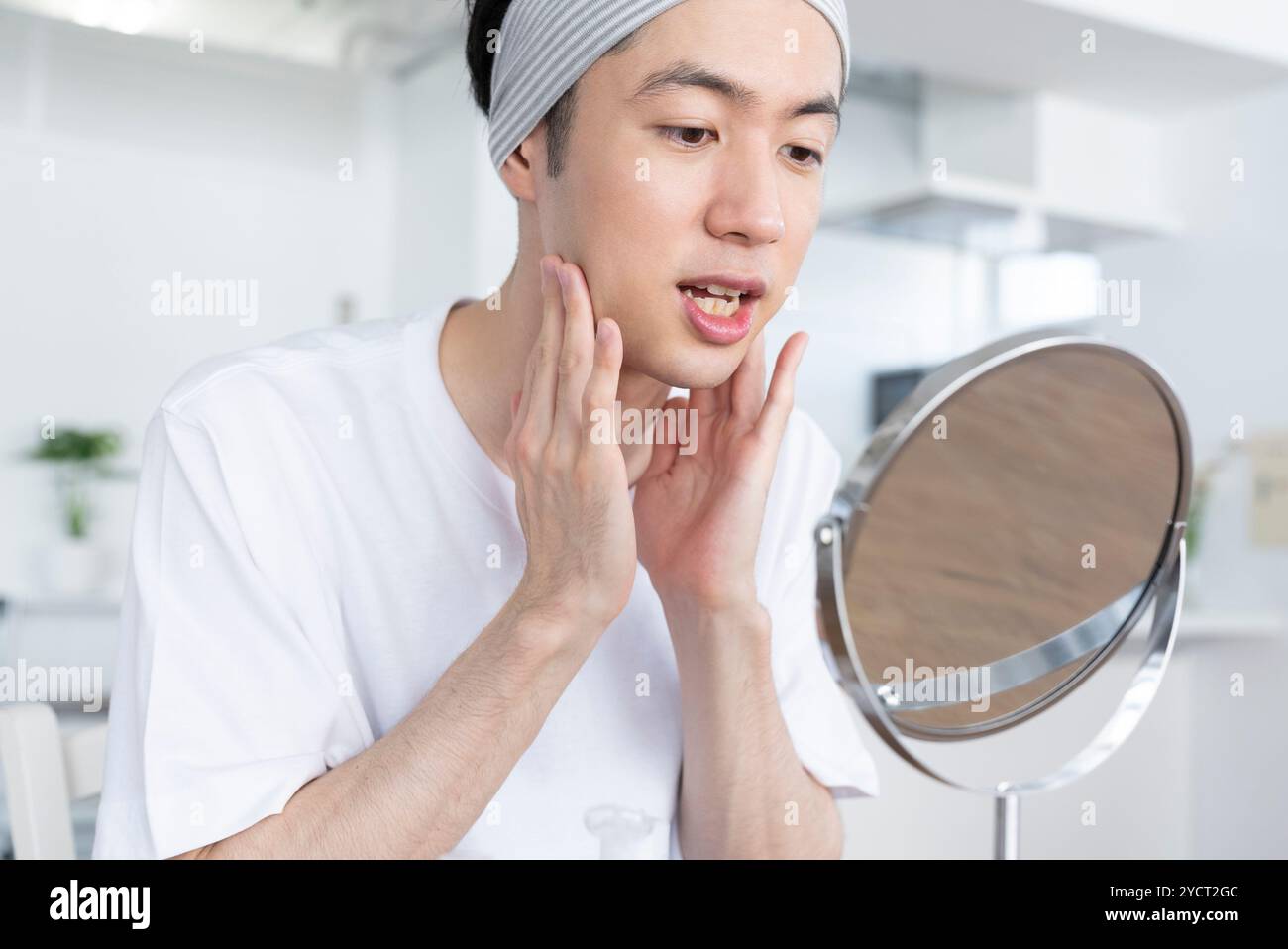 Man taking care of his skin Stock Photo - Alamy