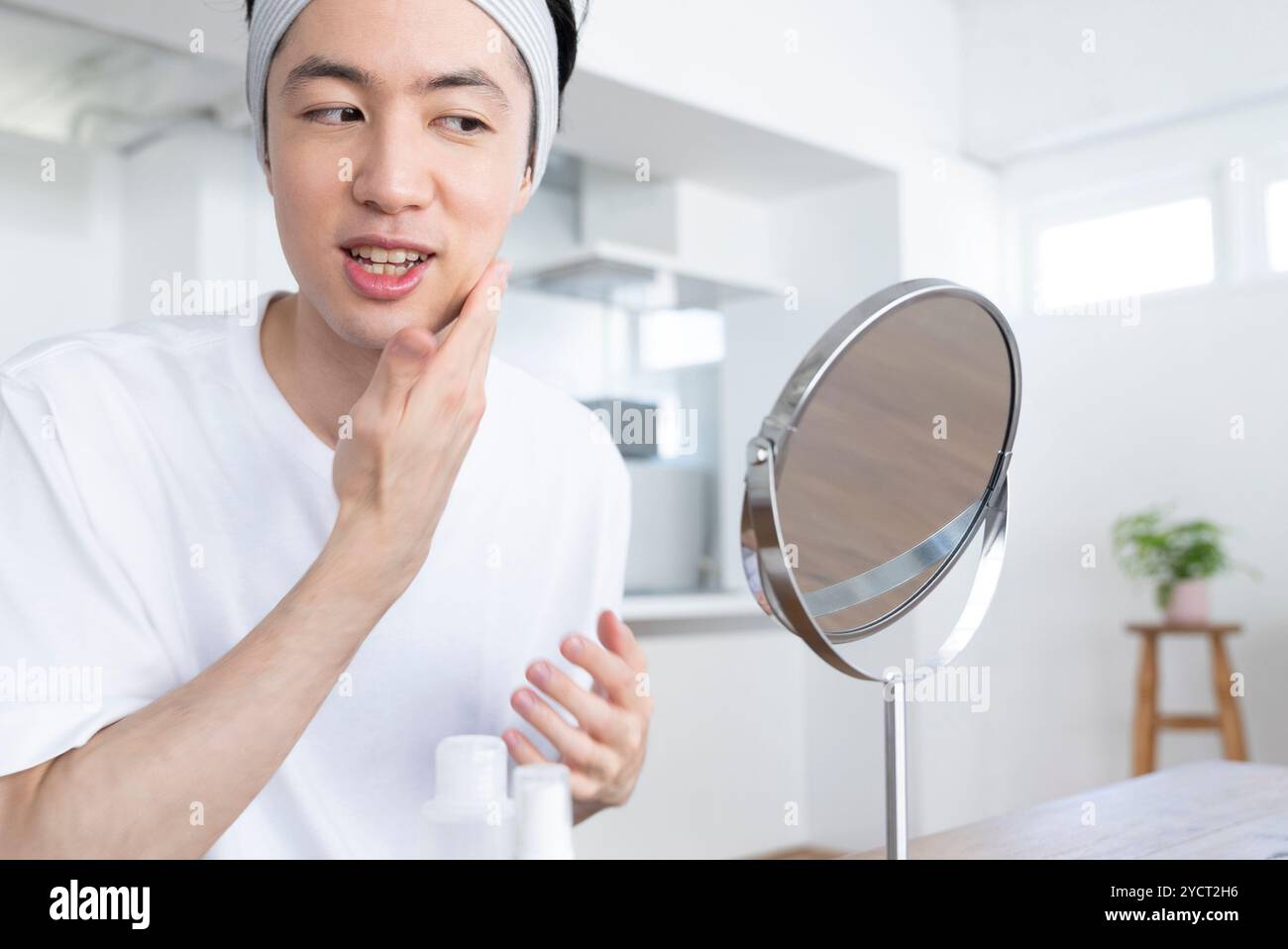 Man taking care of his skin Stock Photo - Alamy