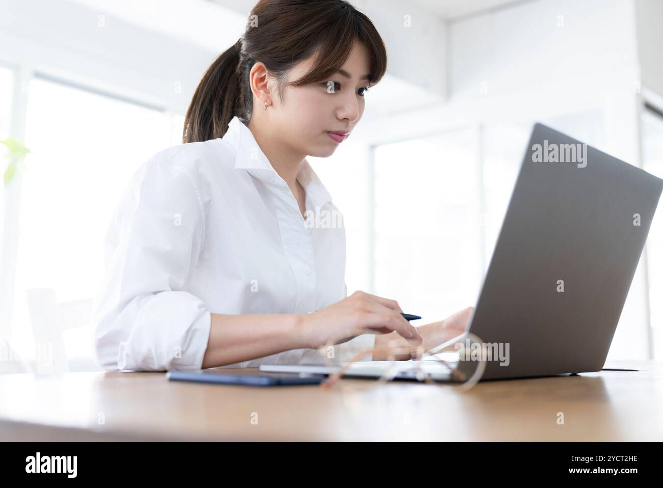 Sit at computer hi-res stock photography and images - Alamy