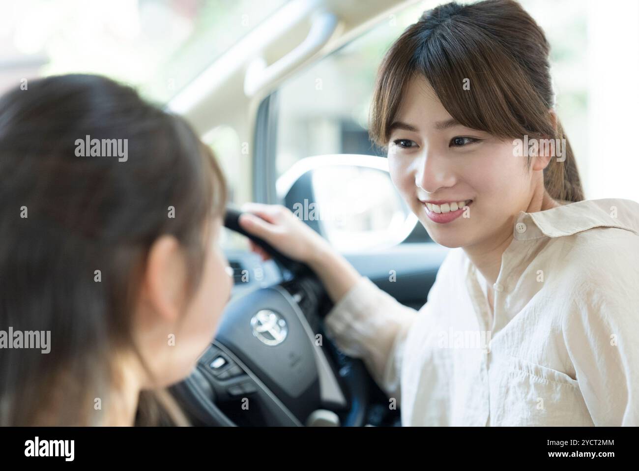 Parent and child in car Stock Photo - Alamy