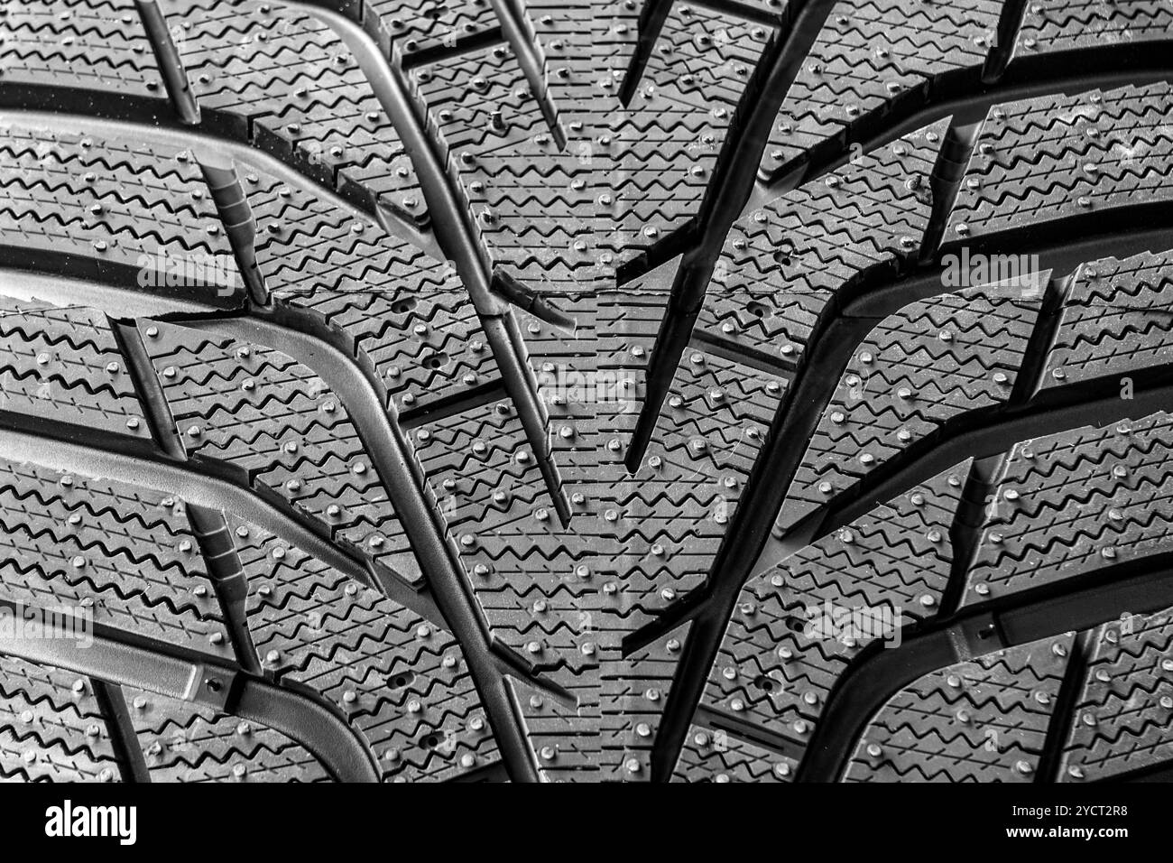 Modern winter tire tread closeup that has passed the braking test on ...