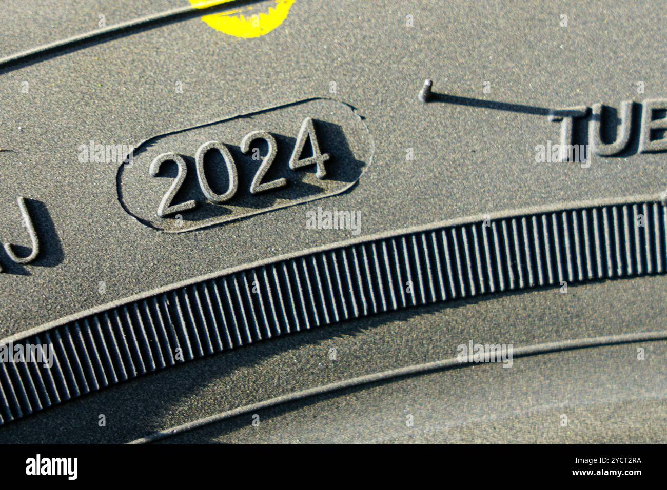 Side view of tire with designation that specify of week and year of ...