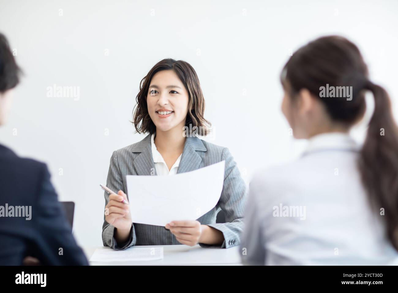 Business people having meetings, interviews and discussions face-to ...