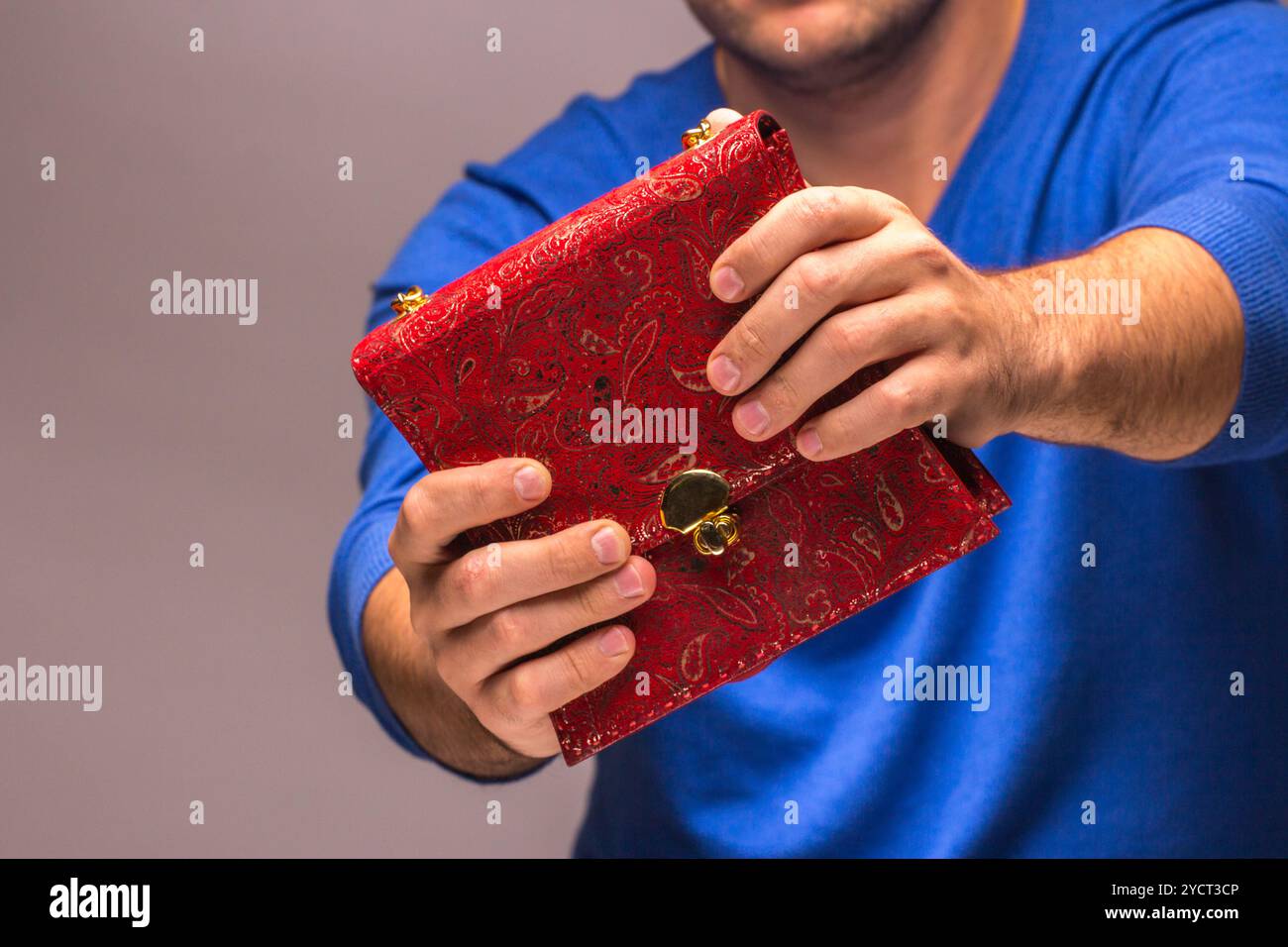 Modern leather bag in hands Stock Photo - Alamy