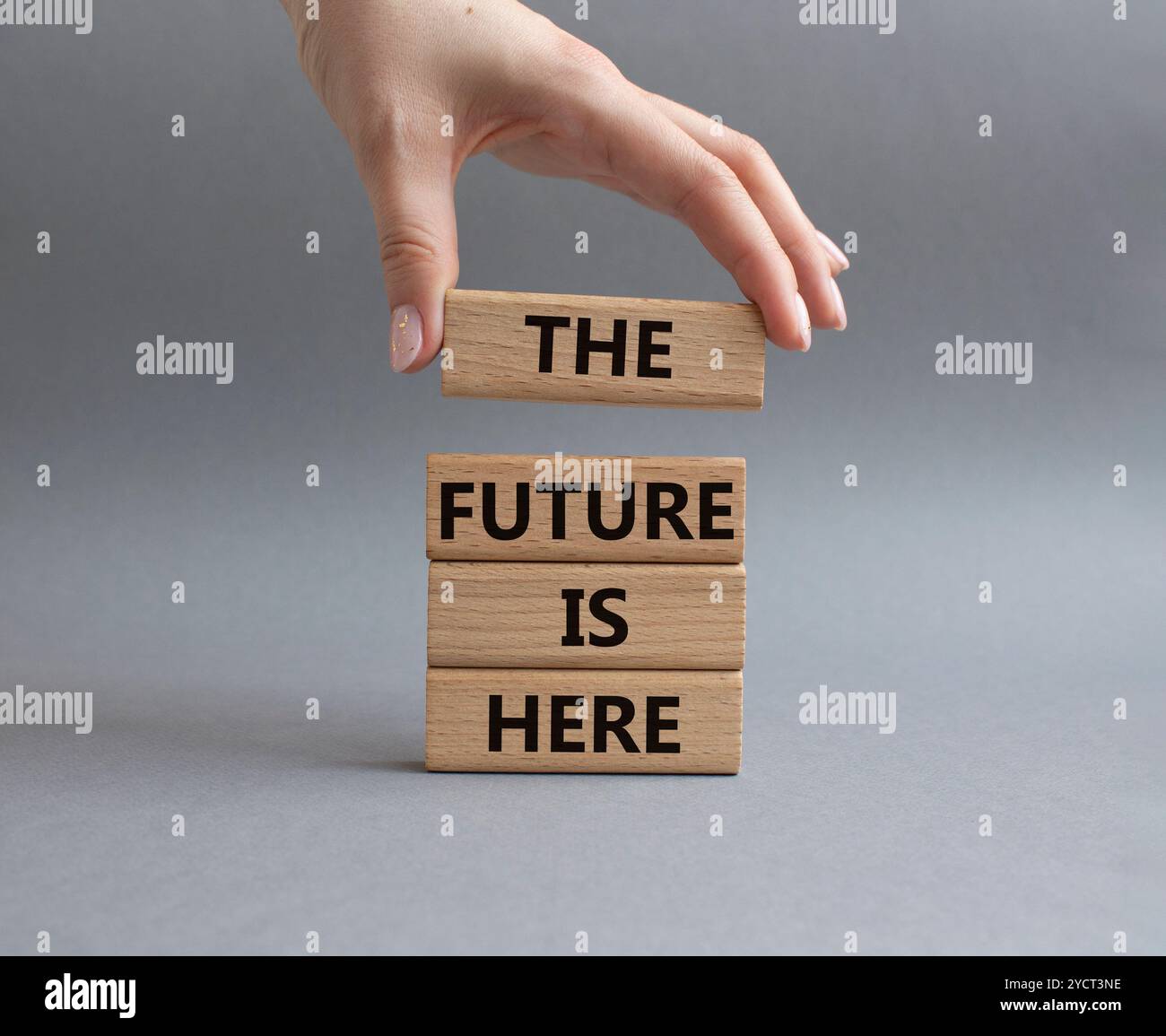 The future is here symbol. Concept words The future is here on wooden ...