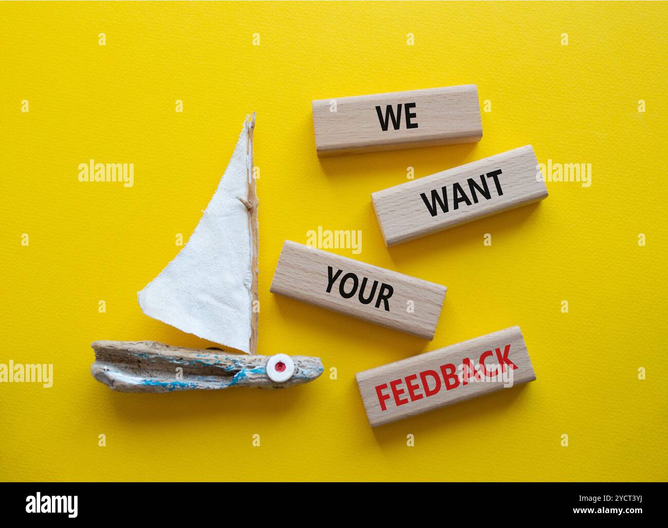 We want your feedback symbol. Wooden blocks with words We want your ...
