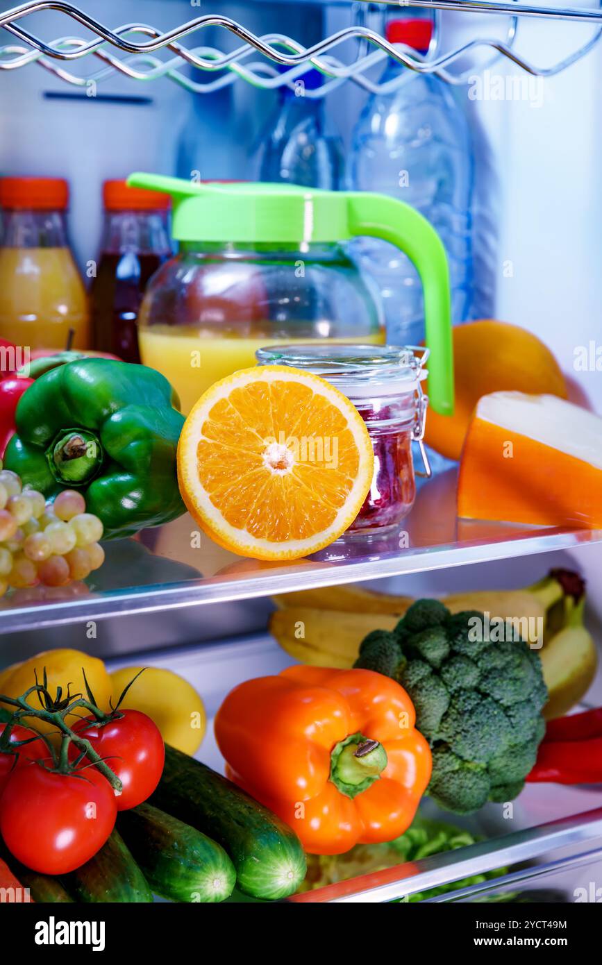 Open refrigerator filled with food Stock Photo - Alamy