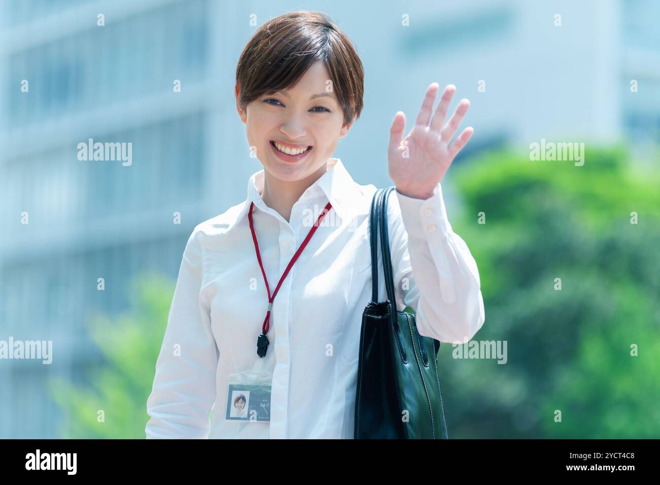 Worker waving hi-res stock photography and images - Alamy