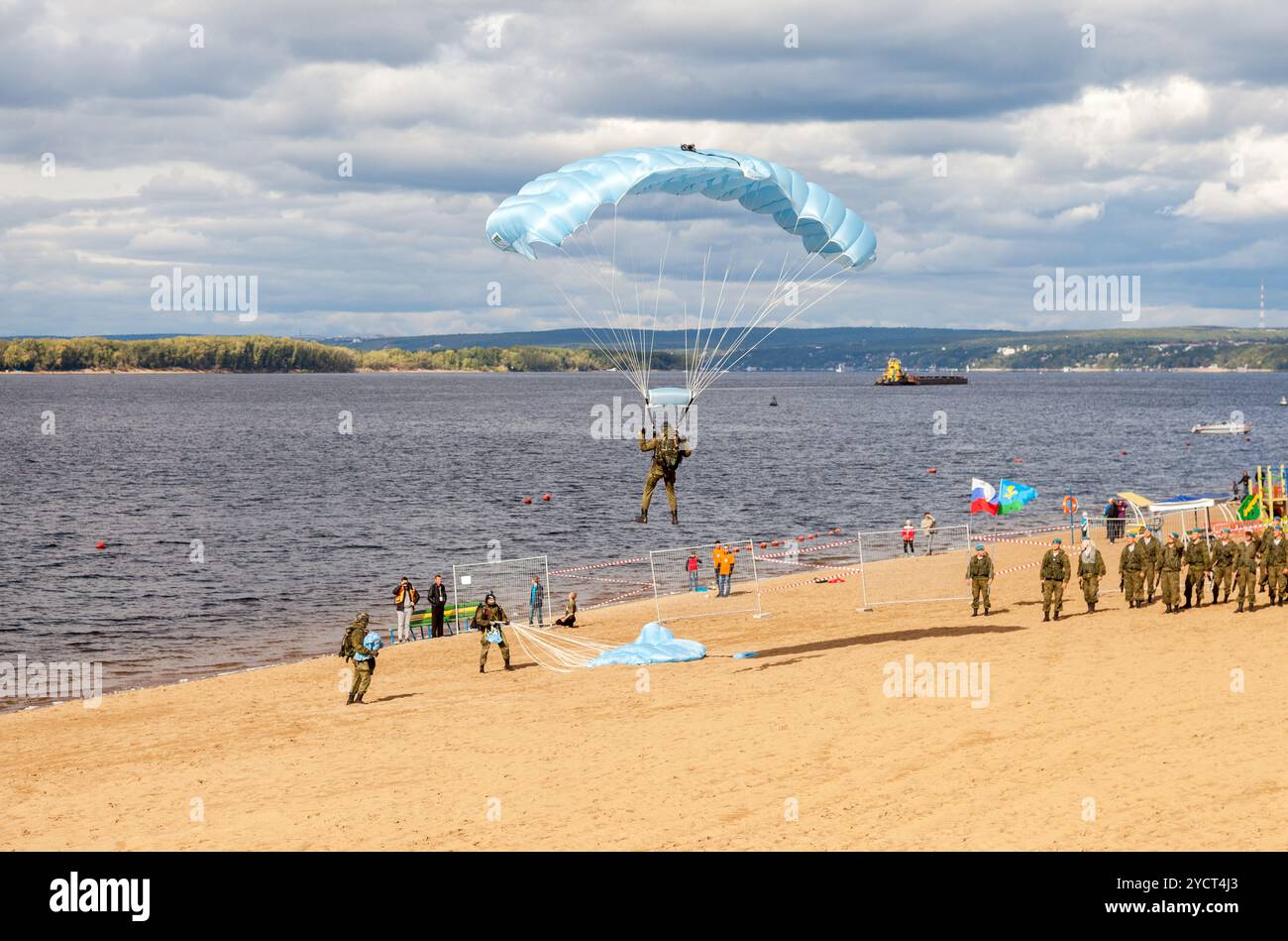 Military parachutists jumper on a wing parachute execute a controlled ...
