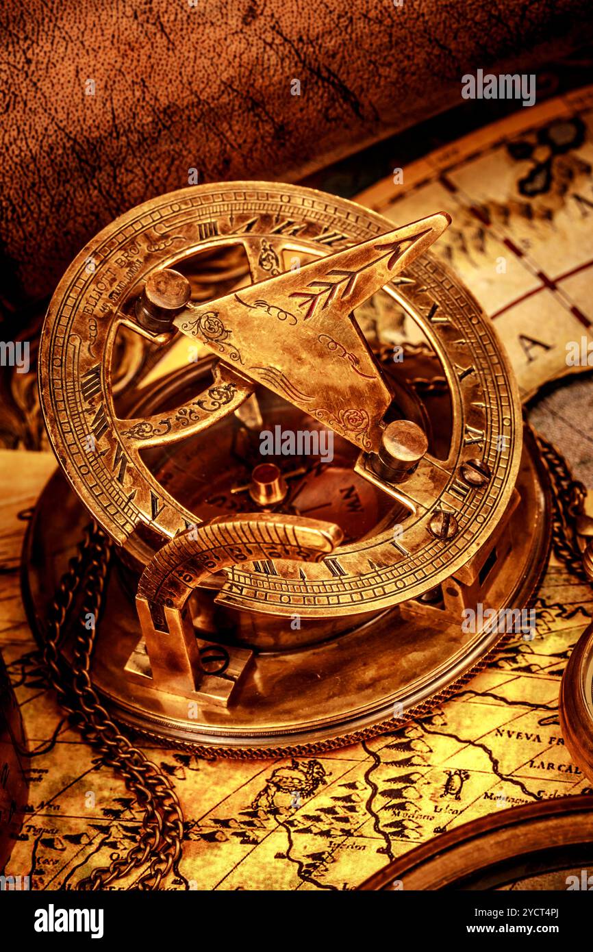 Vintage compass lies on an ancient world map Stock Photo - Alamy