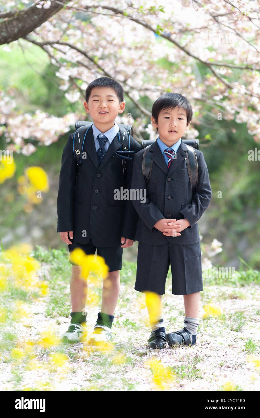 Two new first-year students standing side by side in formal dress Stock ...