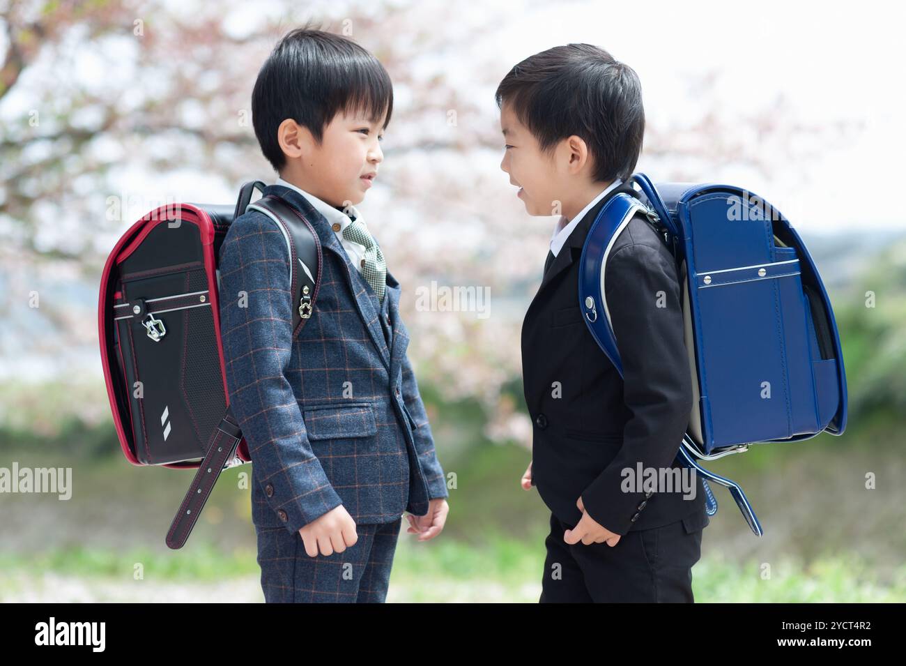 New first-year boy smiling in formal dress Stock Photo - Alamy