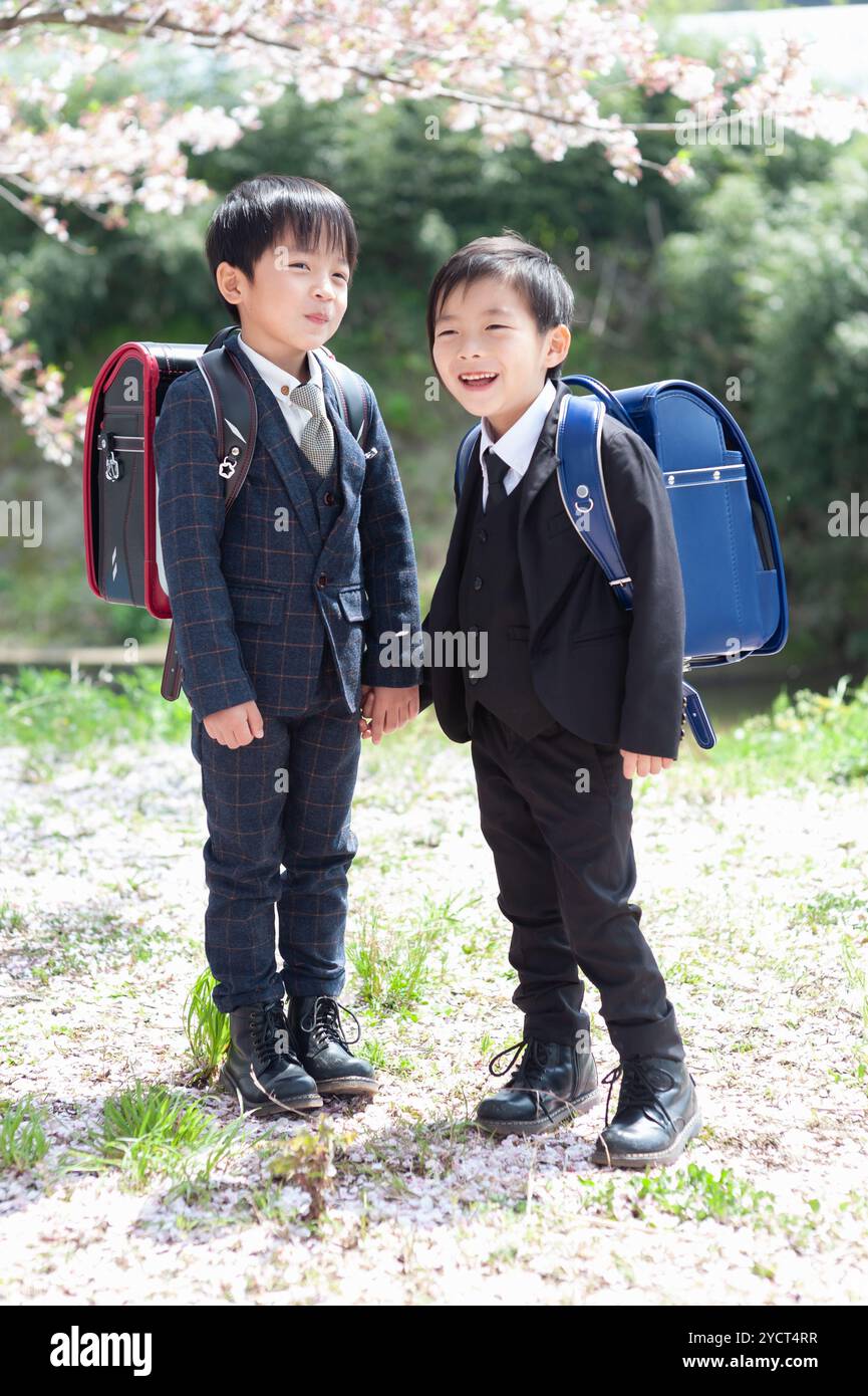 Two new first-year students standing side by side in formal dress Stock ...