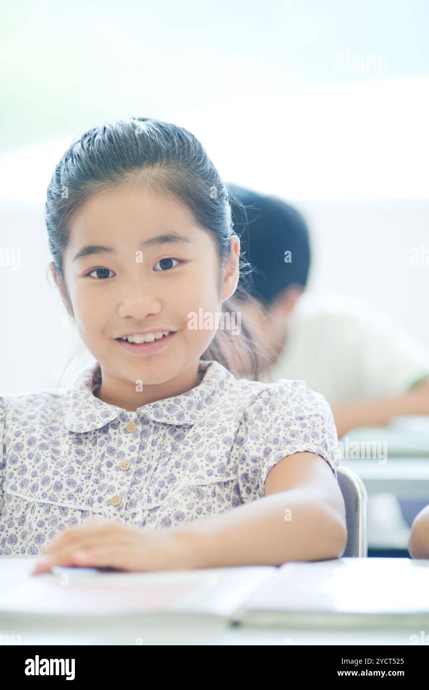 Primary schools student studying Stock Photo - Alamy