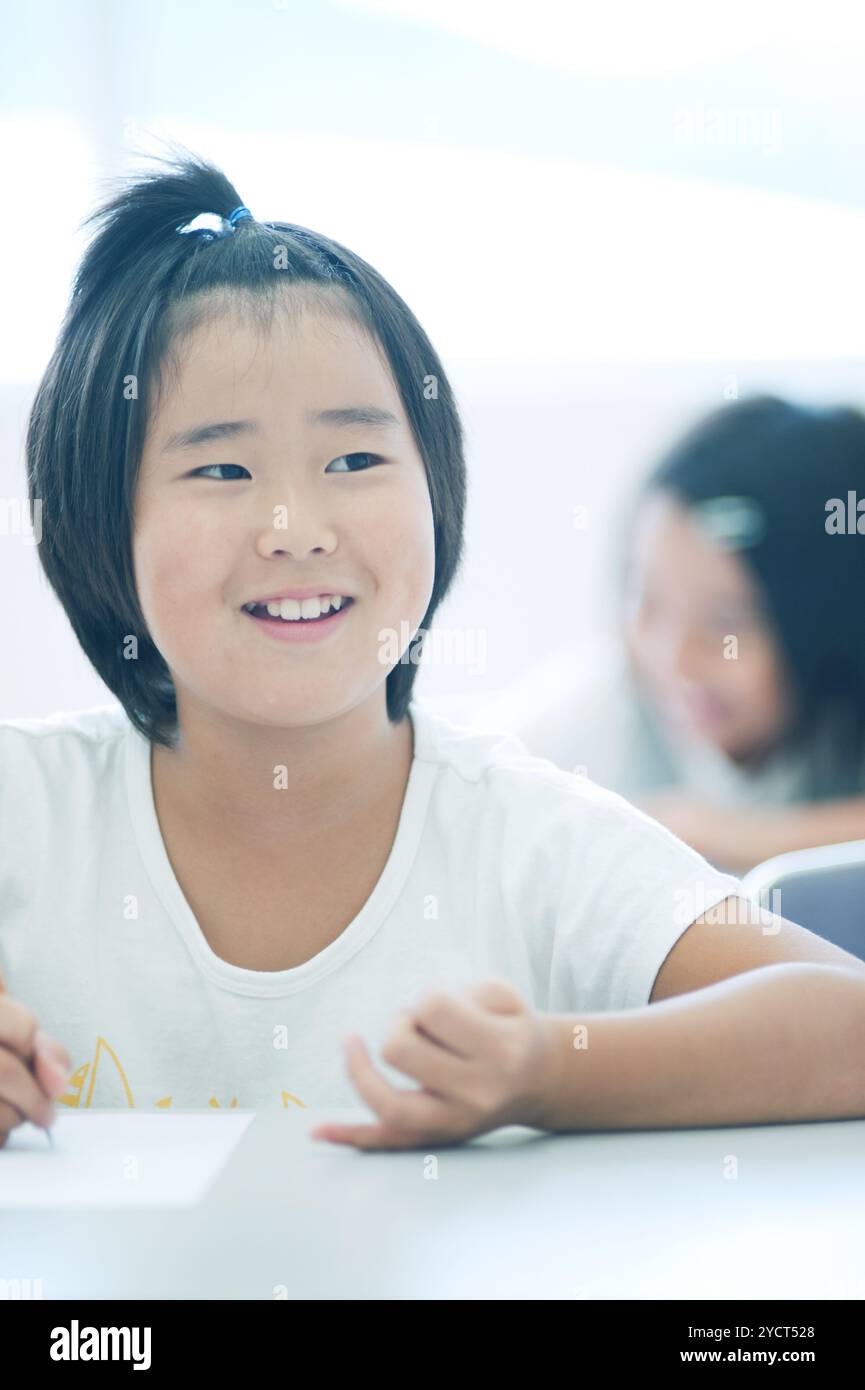 Primary schools student studying Stock Photo - Alamy