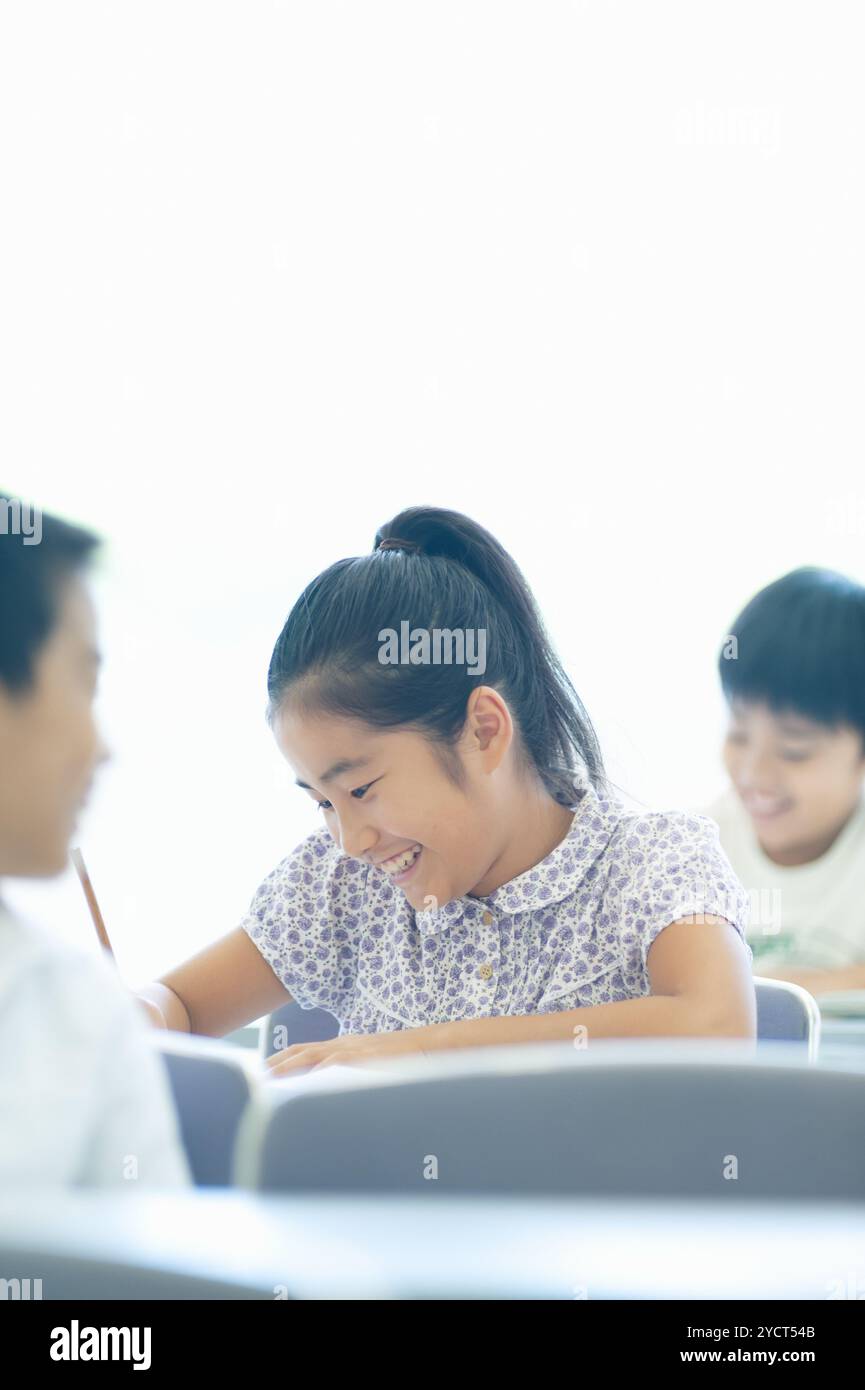 Primary schools student studying Stock Photo - Alamy
