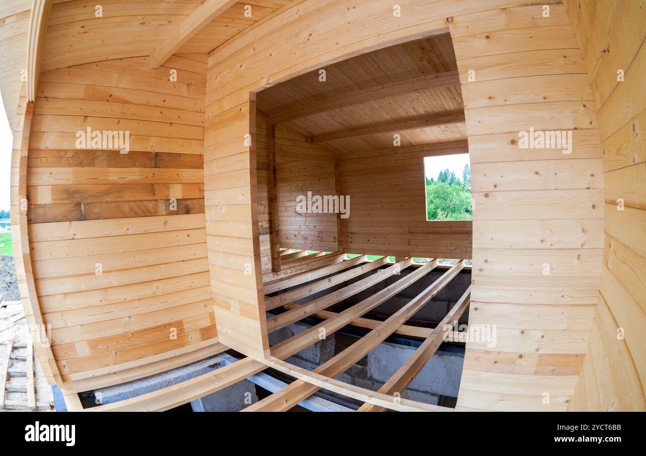 Construction of a new wooden house. Inside view Stock Photo - Alamy