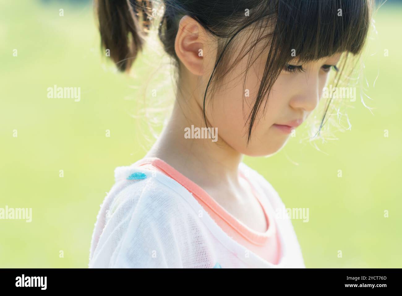 Calm girl in profile Stock Photo - Alamy