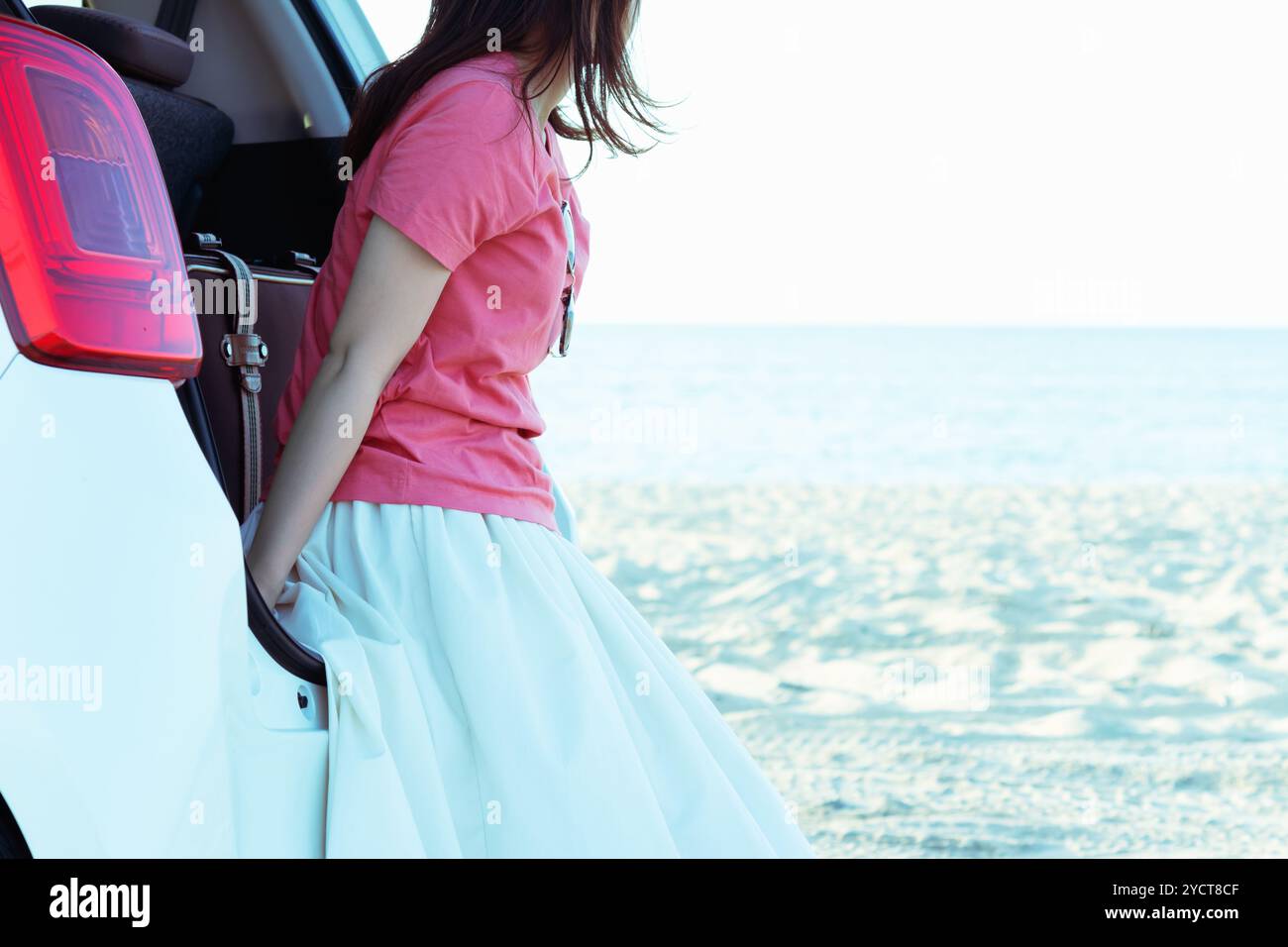 Woman back view seaside hi-res stock photography and images - Alamy