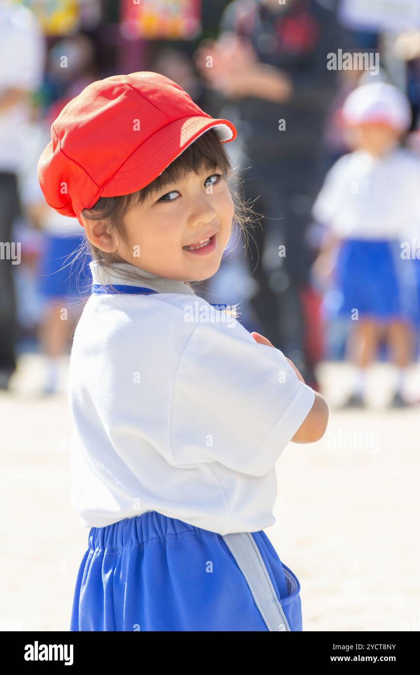 Smiling schoolchildren at sports day Stock Photo - Alamy