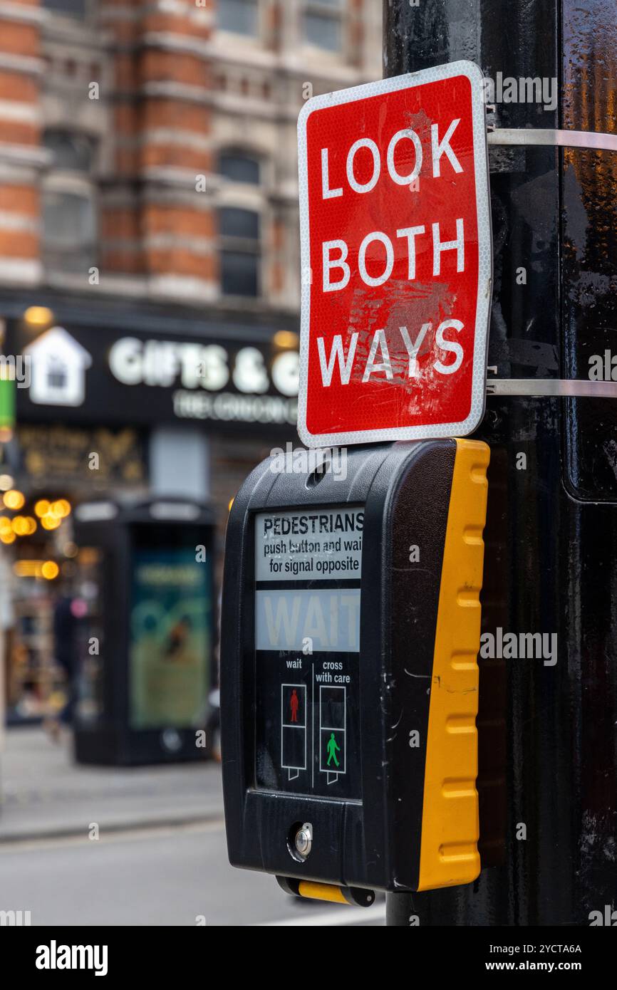 Pedestrian crossing signal button Stock Photo - Alamy