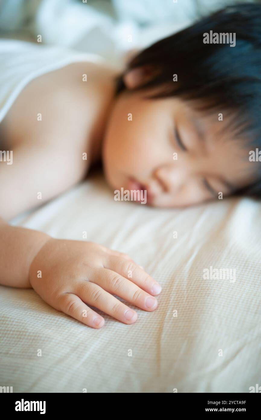 Boy taking a pleasant nap Stock Photo - Alamy