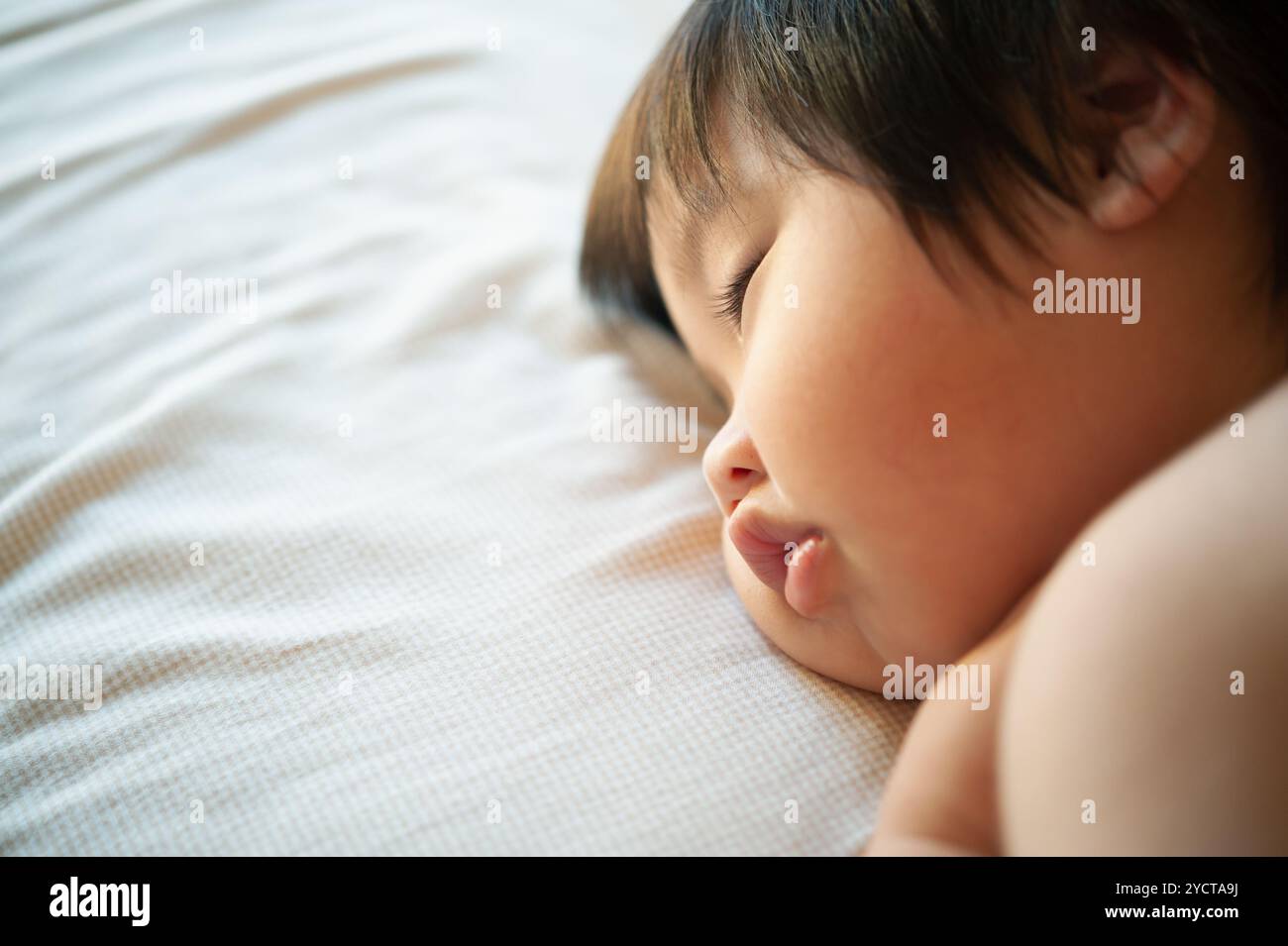 Boy taking a pleasant nap Stock Photo - Alamy