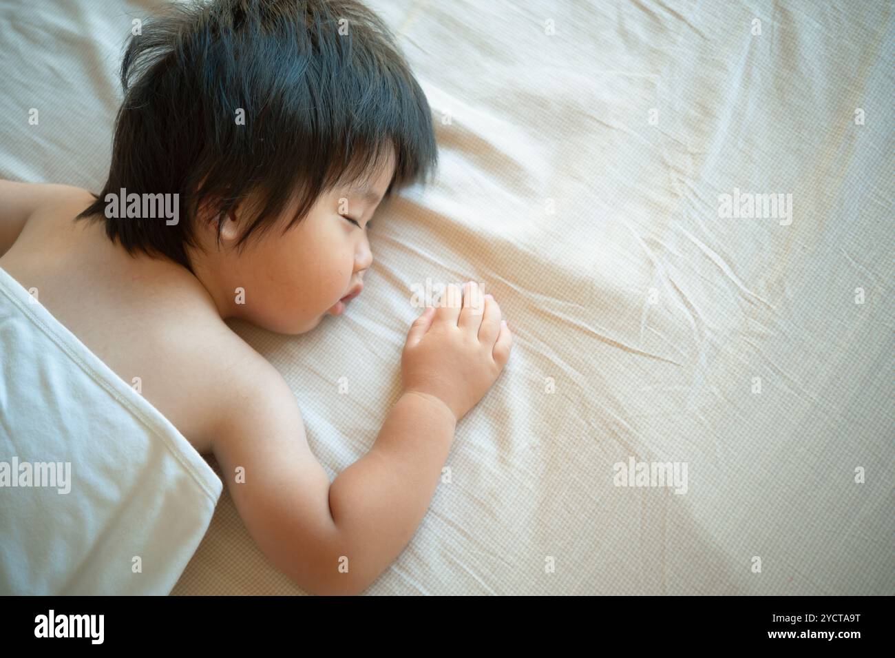 Boy taking a pleasant nap Stock Photo - Alamy