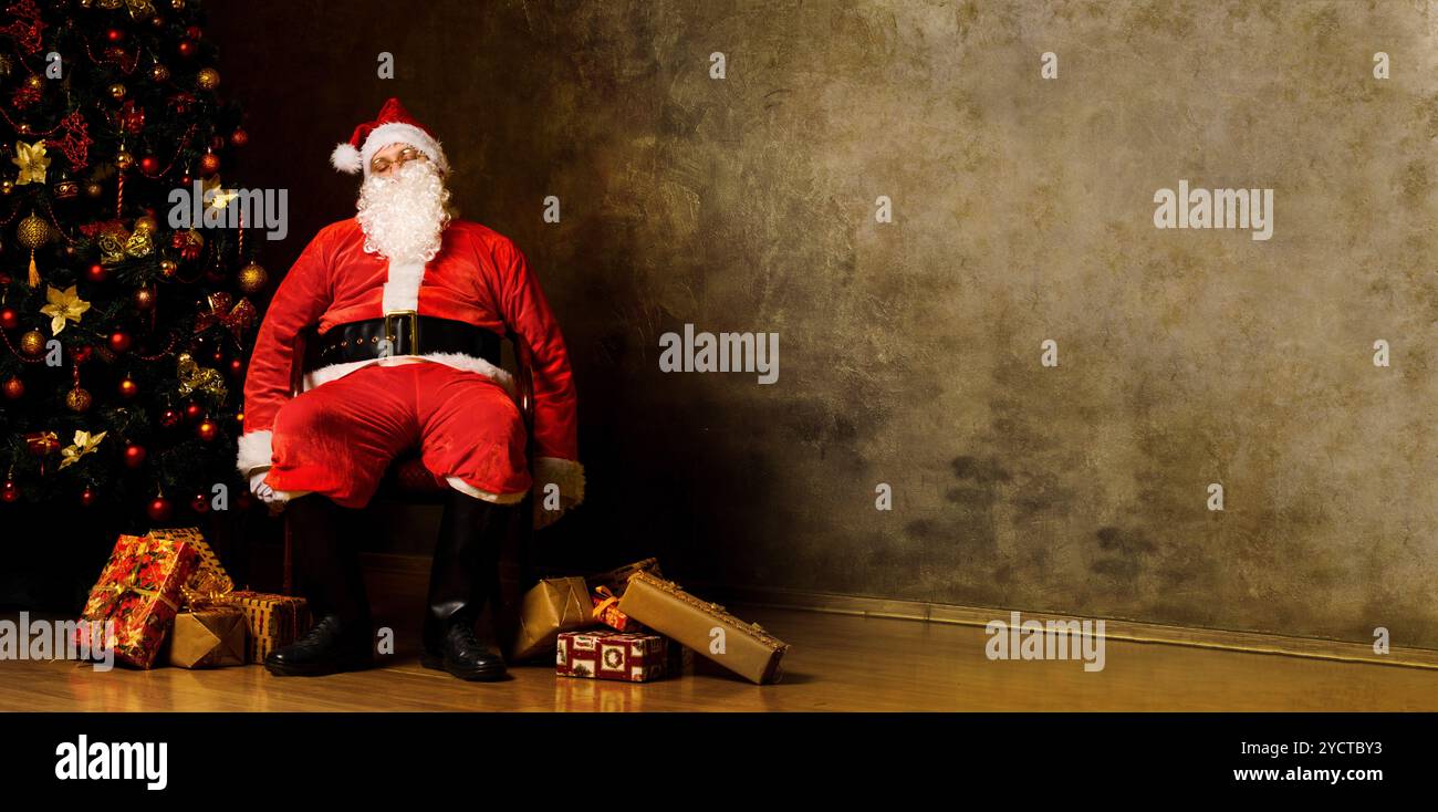 Tired Santa Claus Stock Photo - Alamy
