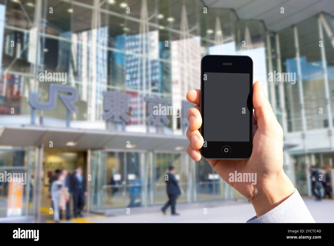 Smartphone held by man Stock Photo - Alamy