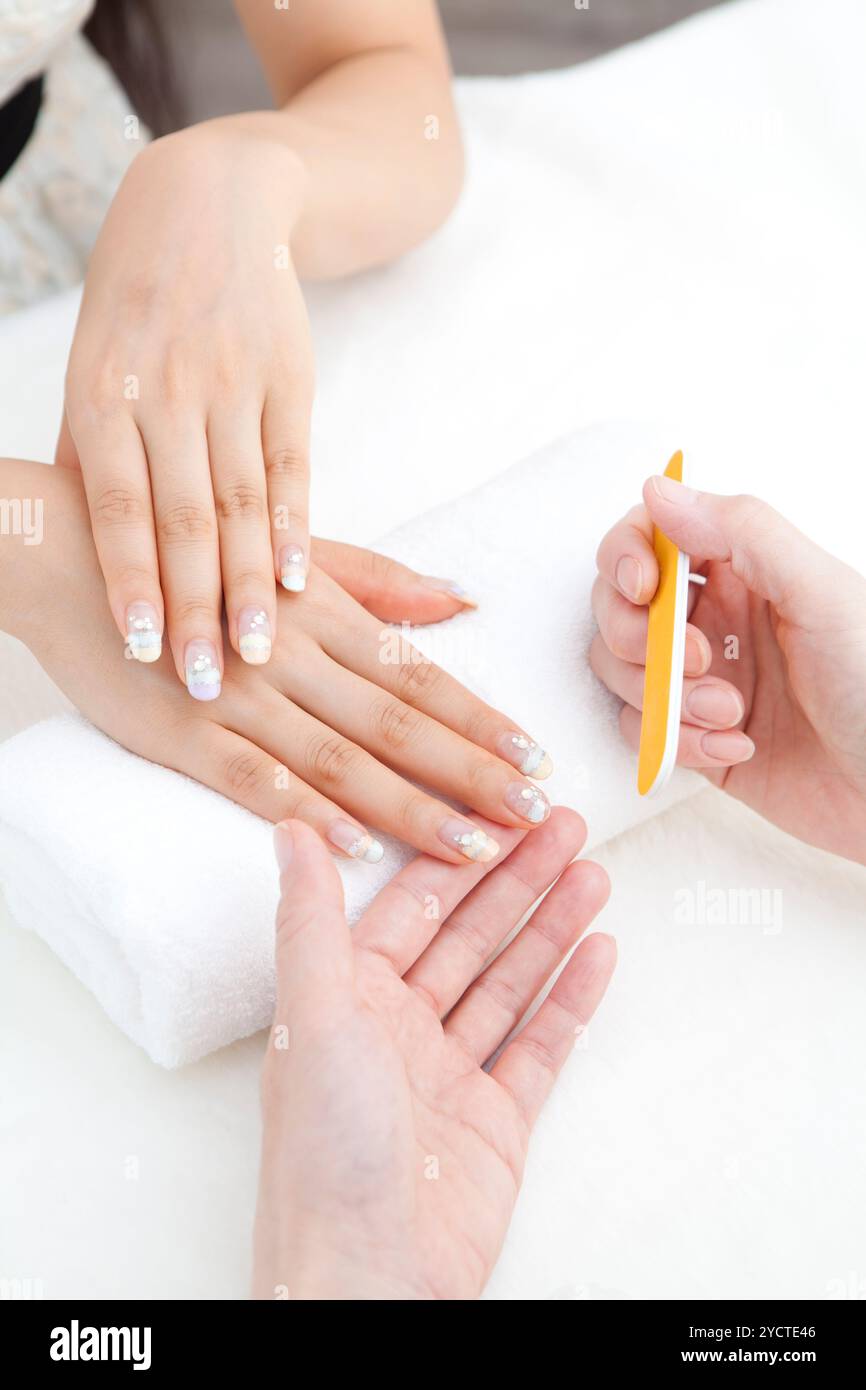Getting nails done hi-res stock photography and images - Alamy