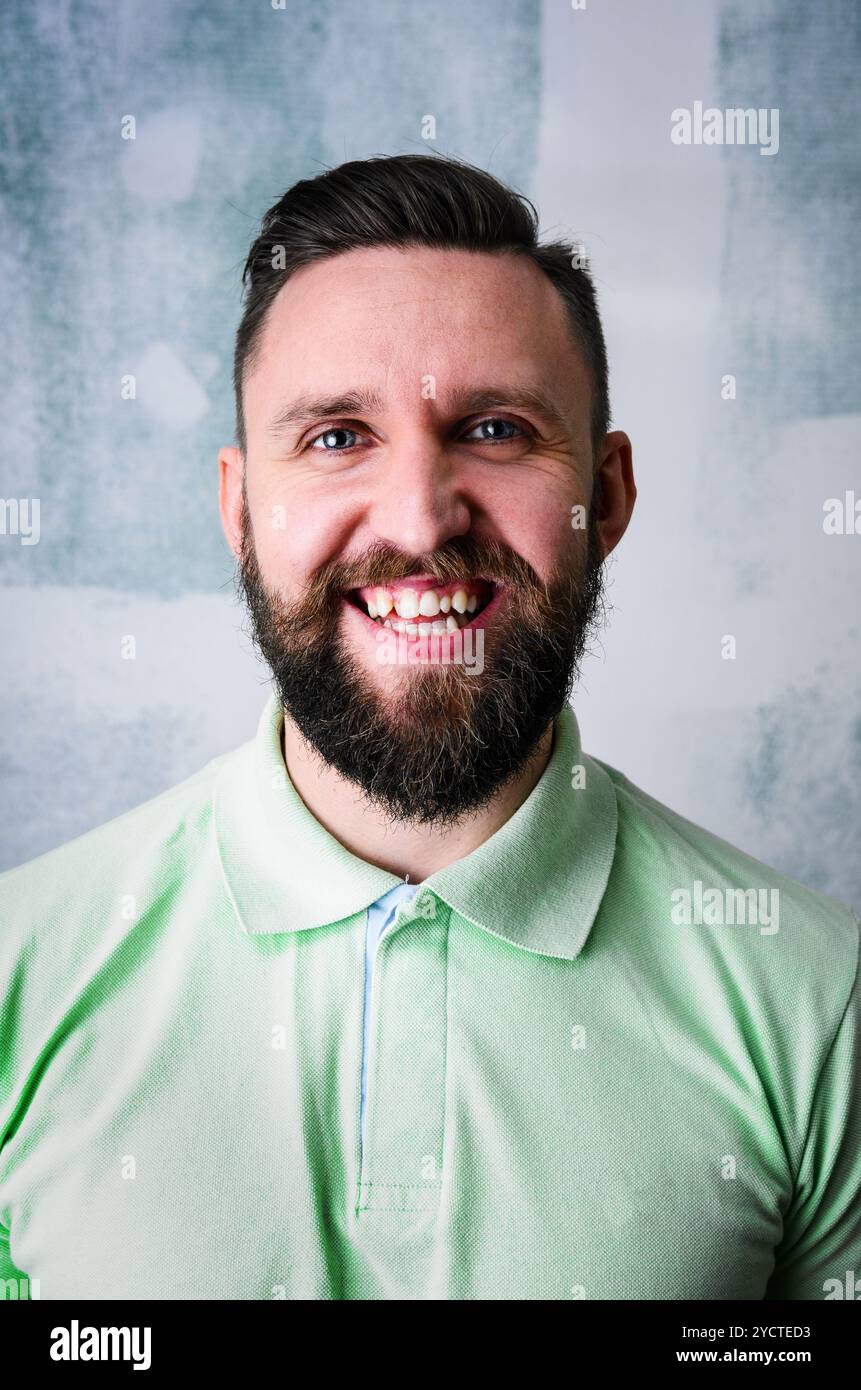 Positive happy young bearded man hi-res stock photography and images ...