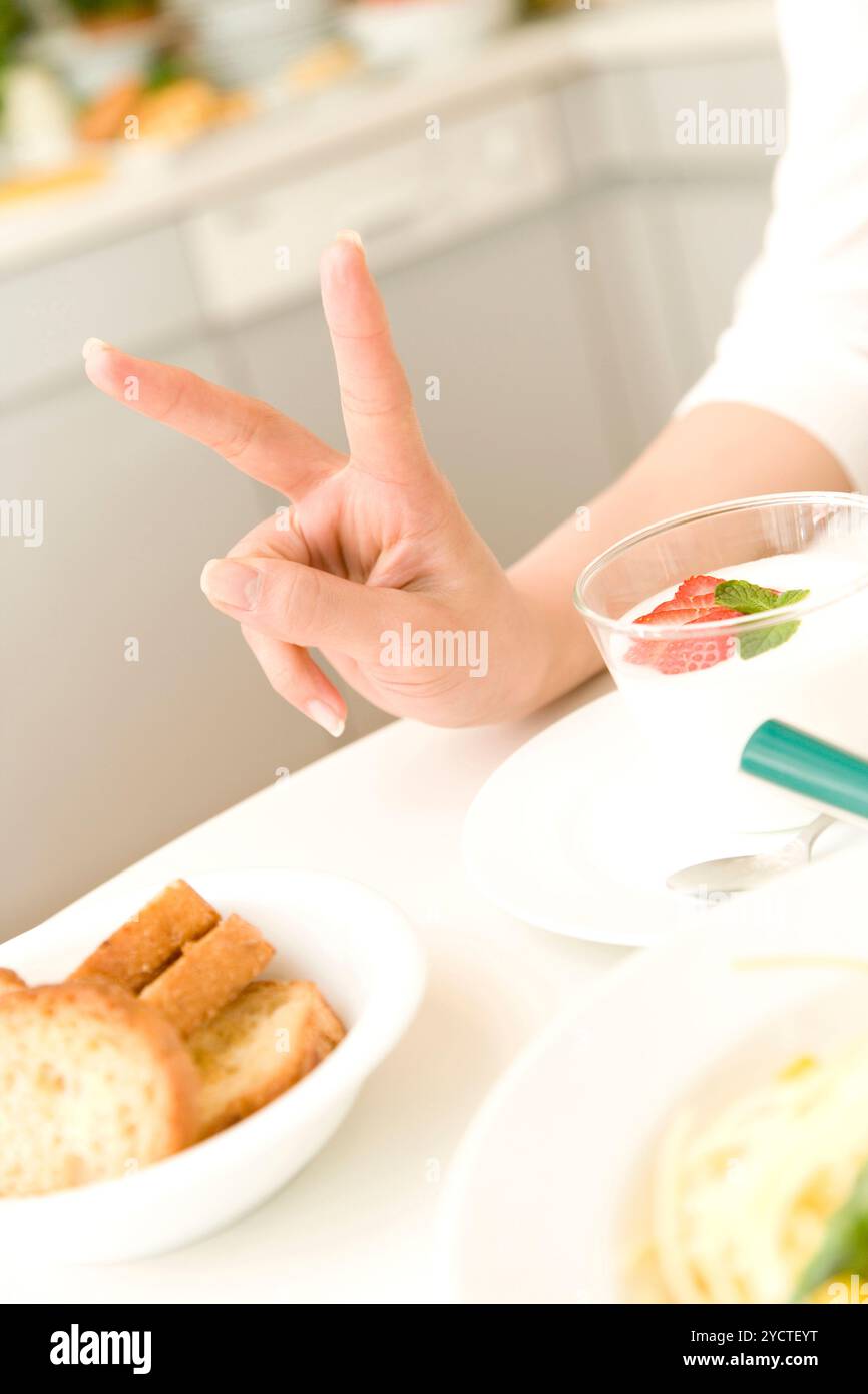 Person doing a peace sign hi-res stock photography and images - Alamy