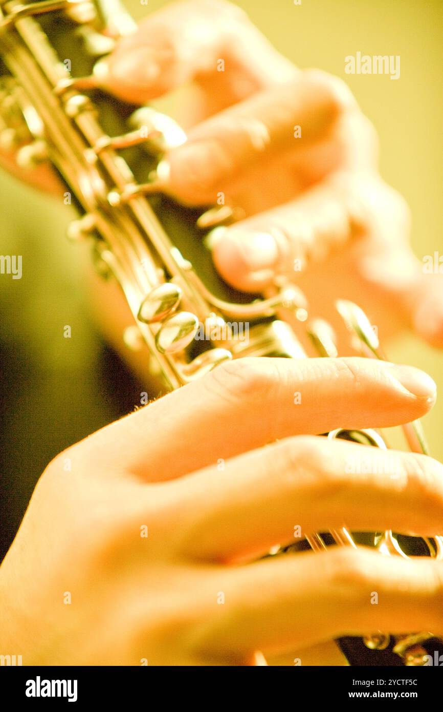 Hand playing clarinet Stock Photo - Alamy