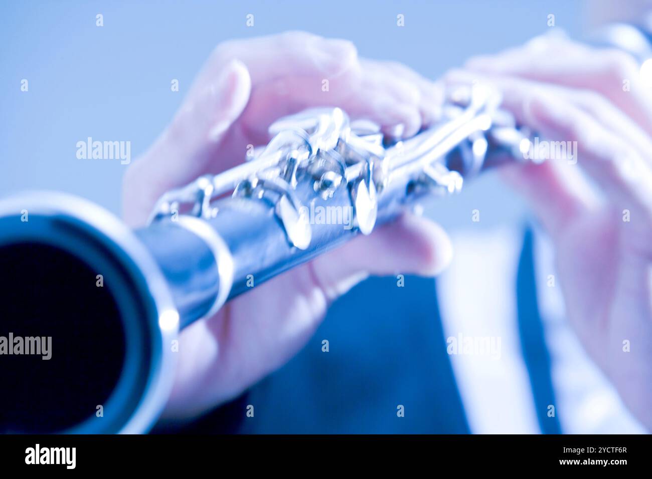 Hand playing clarinet Stock Photo - Alamy
