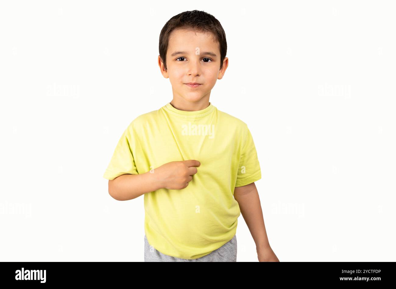 This is me.Portrait of happy preschool boy in yellow shirt joyfully ...