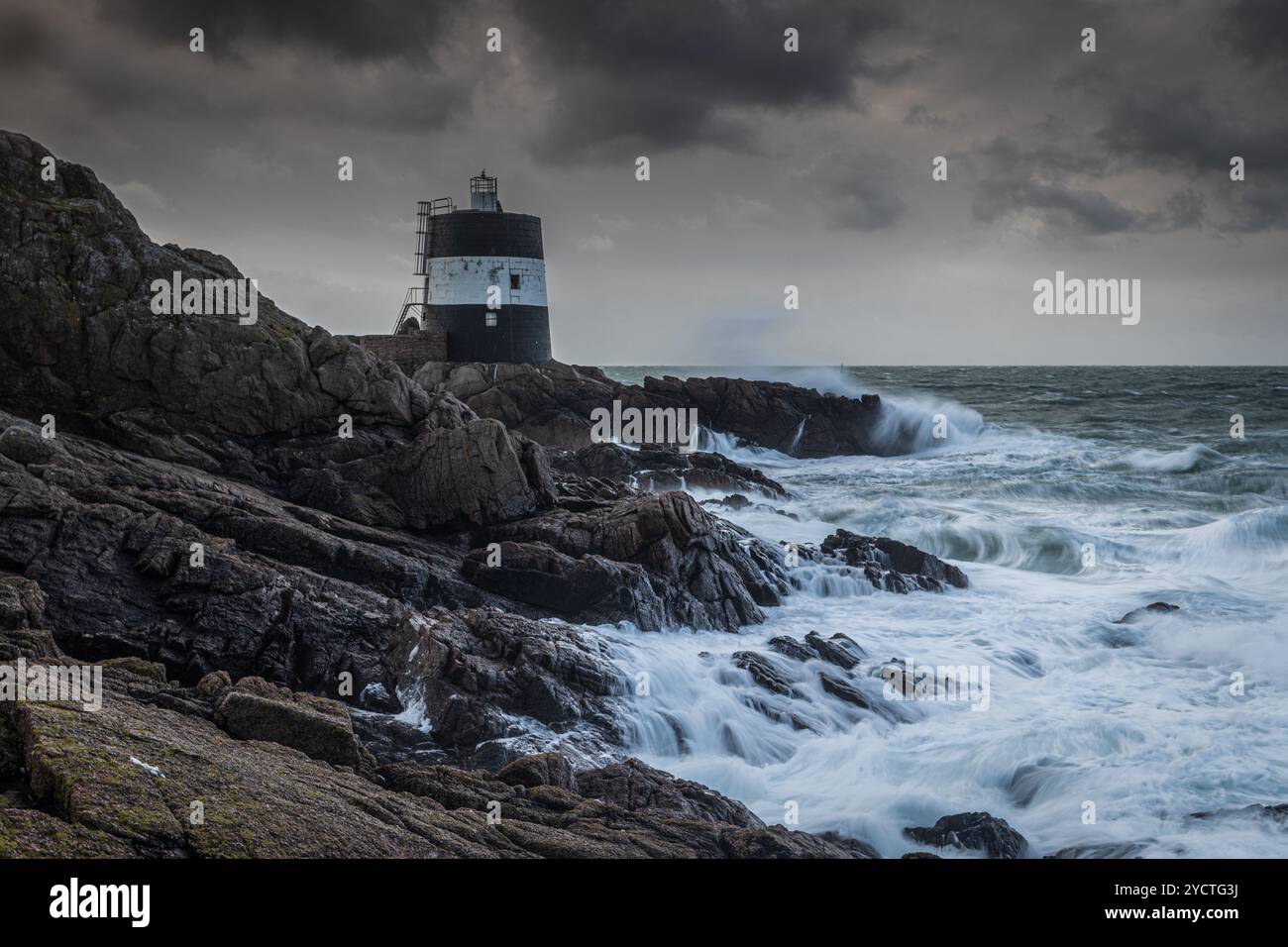 Tour de Vinde lighthouse at the Noirmont lookout point in wind and ...