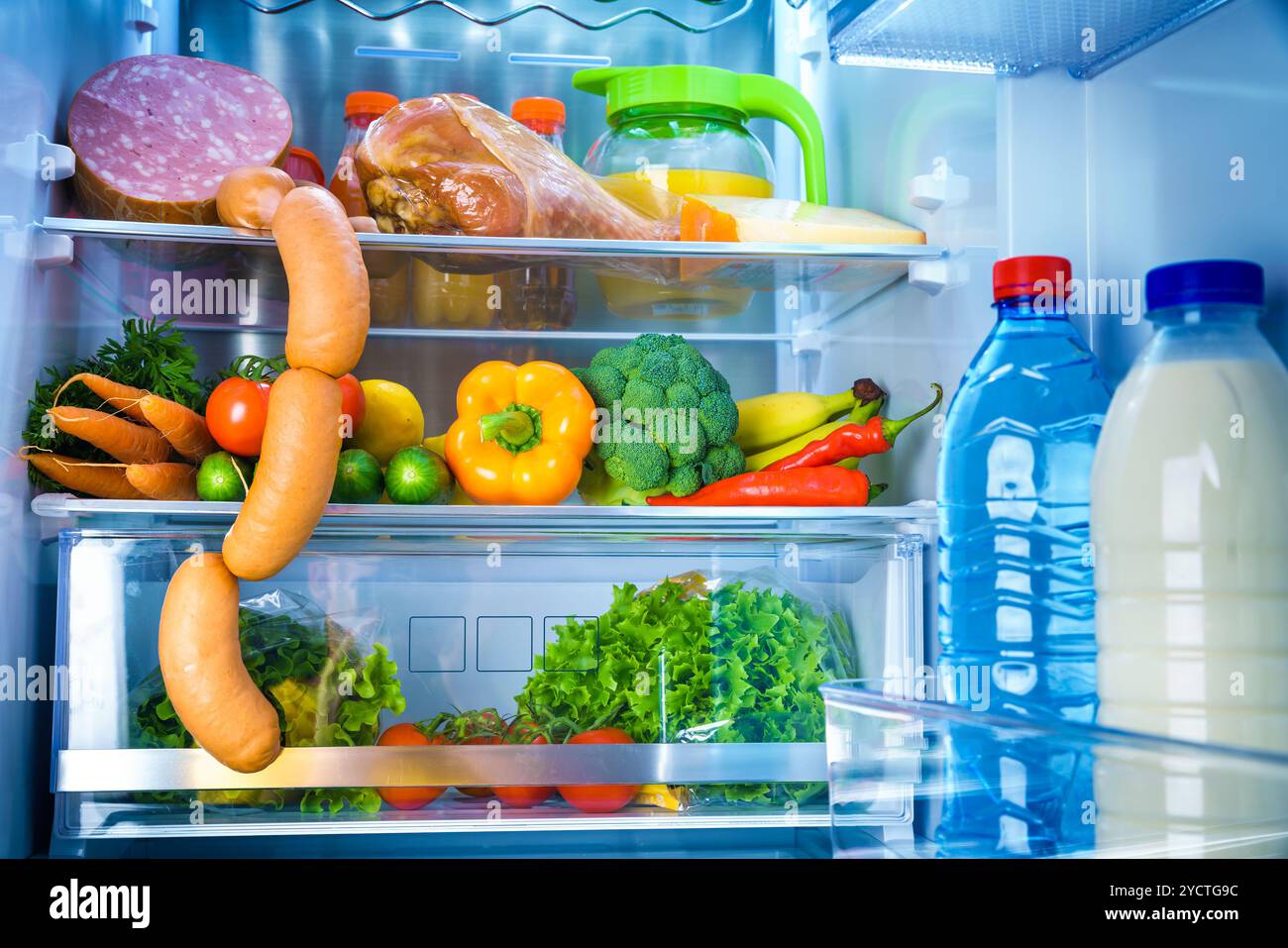 Open refrigerator filled with food Stock Photo - Alamy