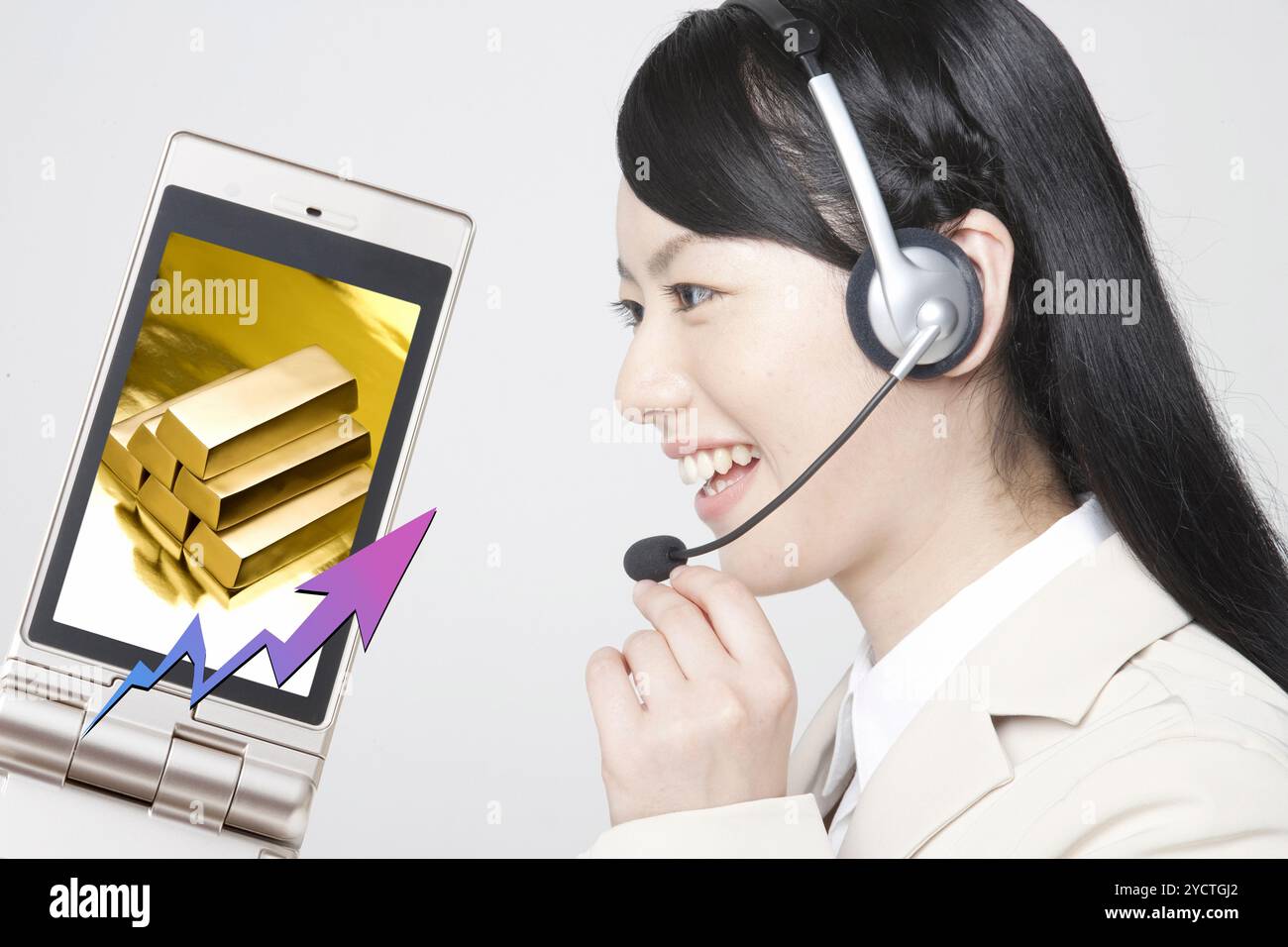 Gold bar and operator on mobile phone screen Stock Photo - Alamy