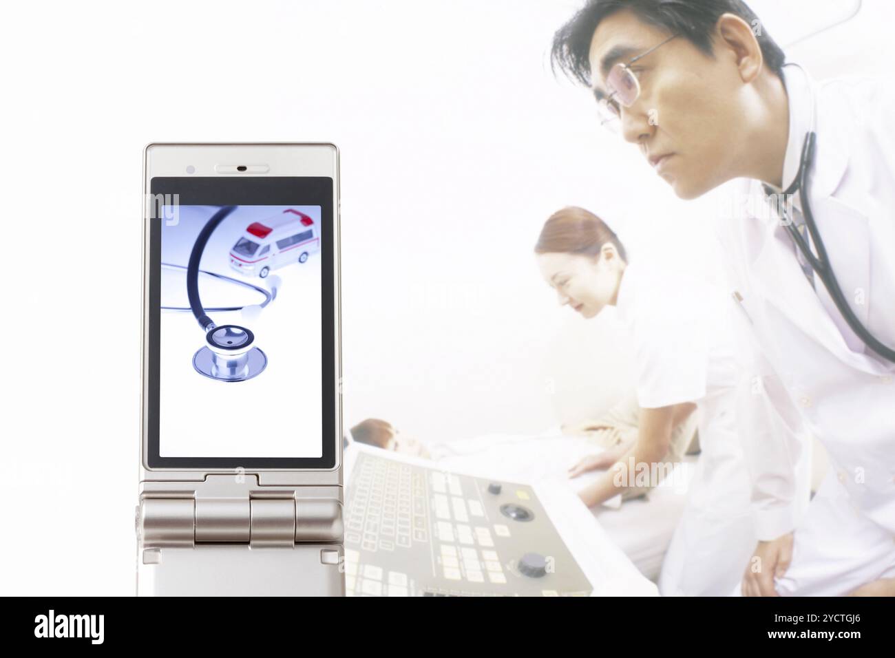 Doctor and nurse and medical equipment on mobile phone screen Stock ...