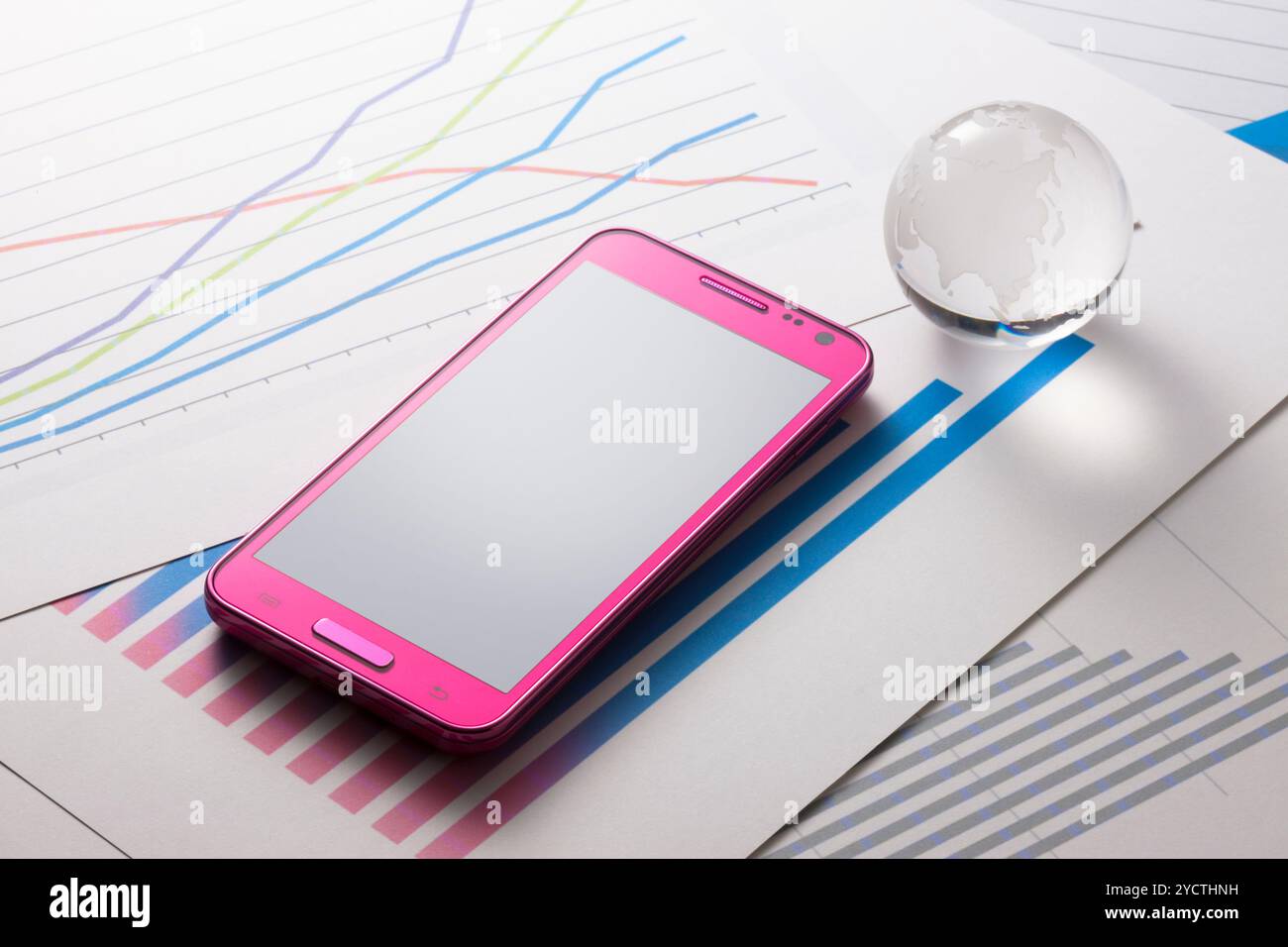 Smartphones and graphical documents Stock Photo - Alamy