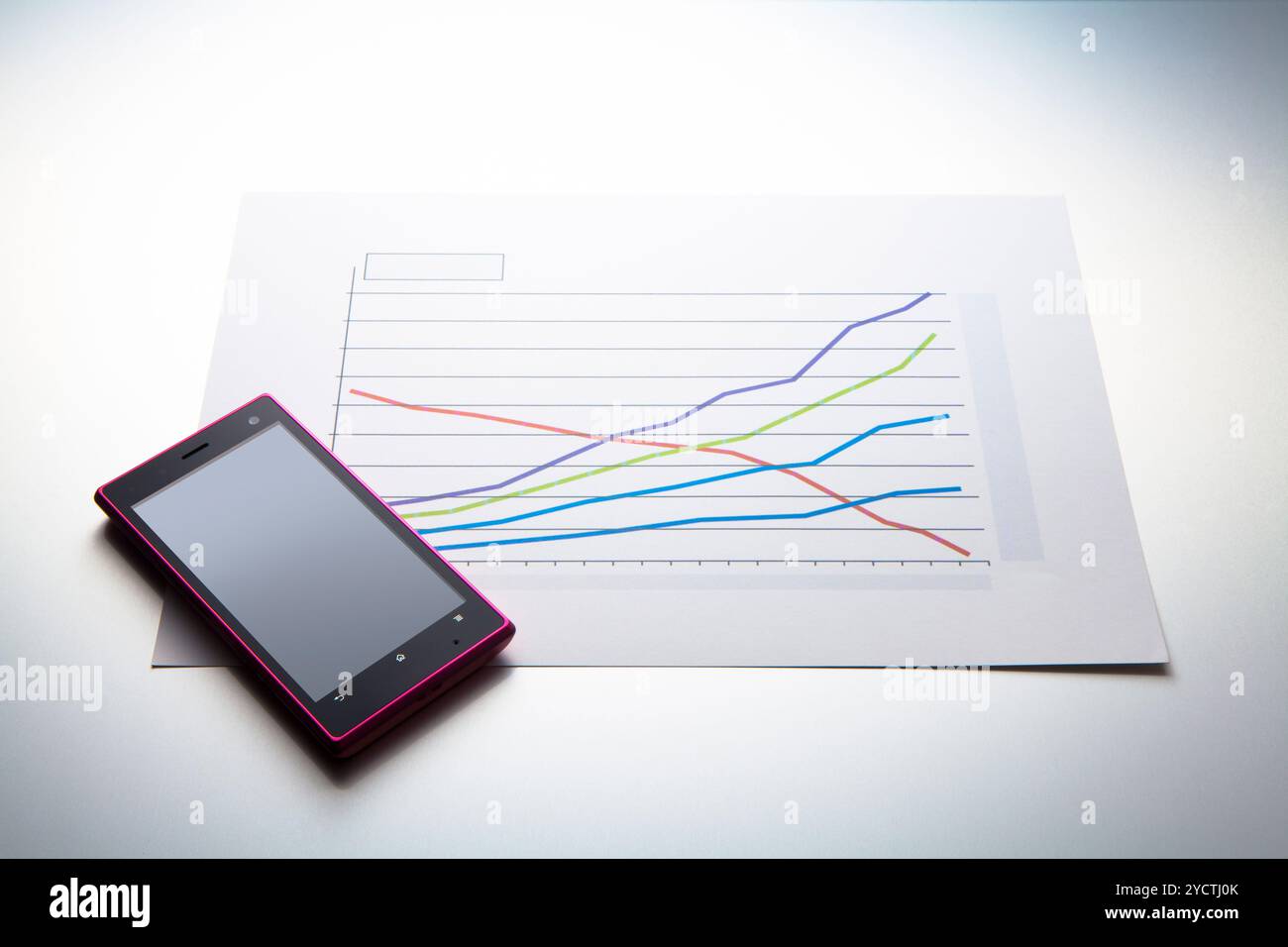 Smartphones and graphical documents Stock Photo - Alamy